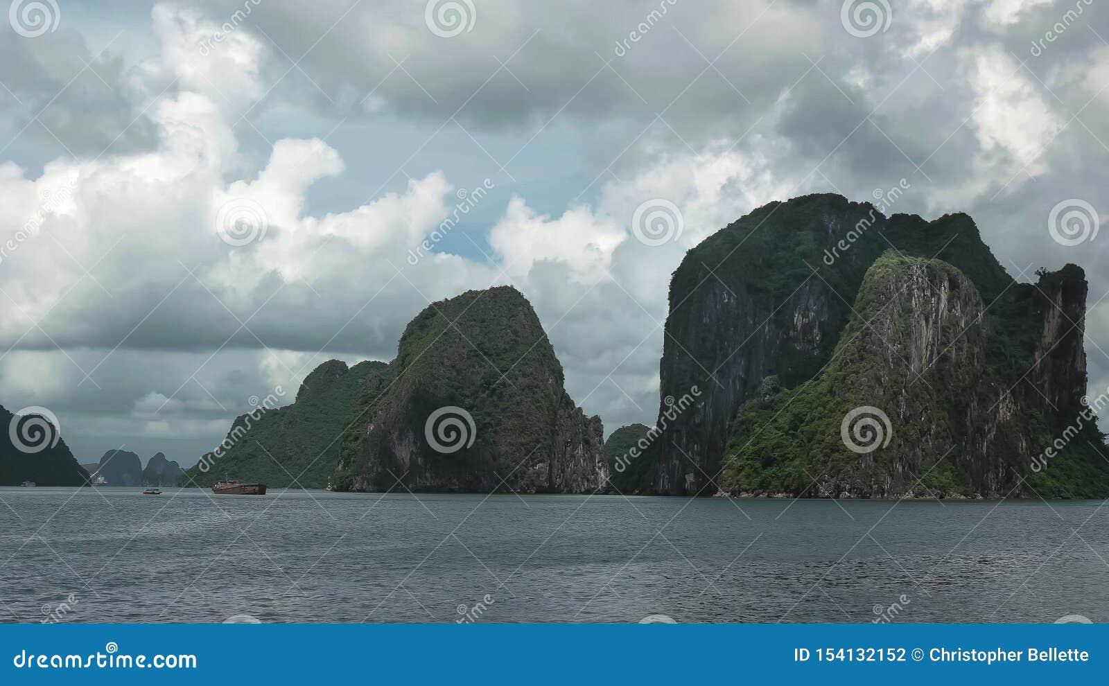Long Shot of a Freight Boat on Ha Long Bay Stock Photo - Image of ...