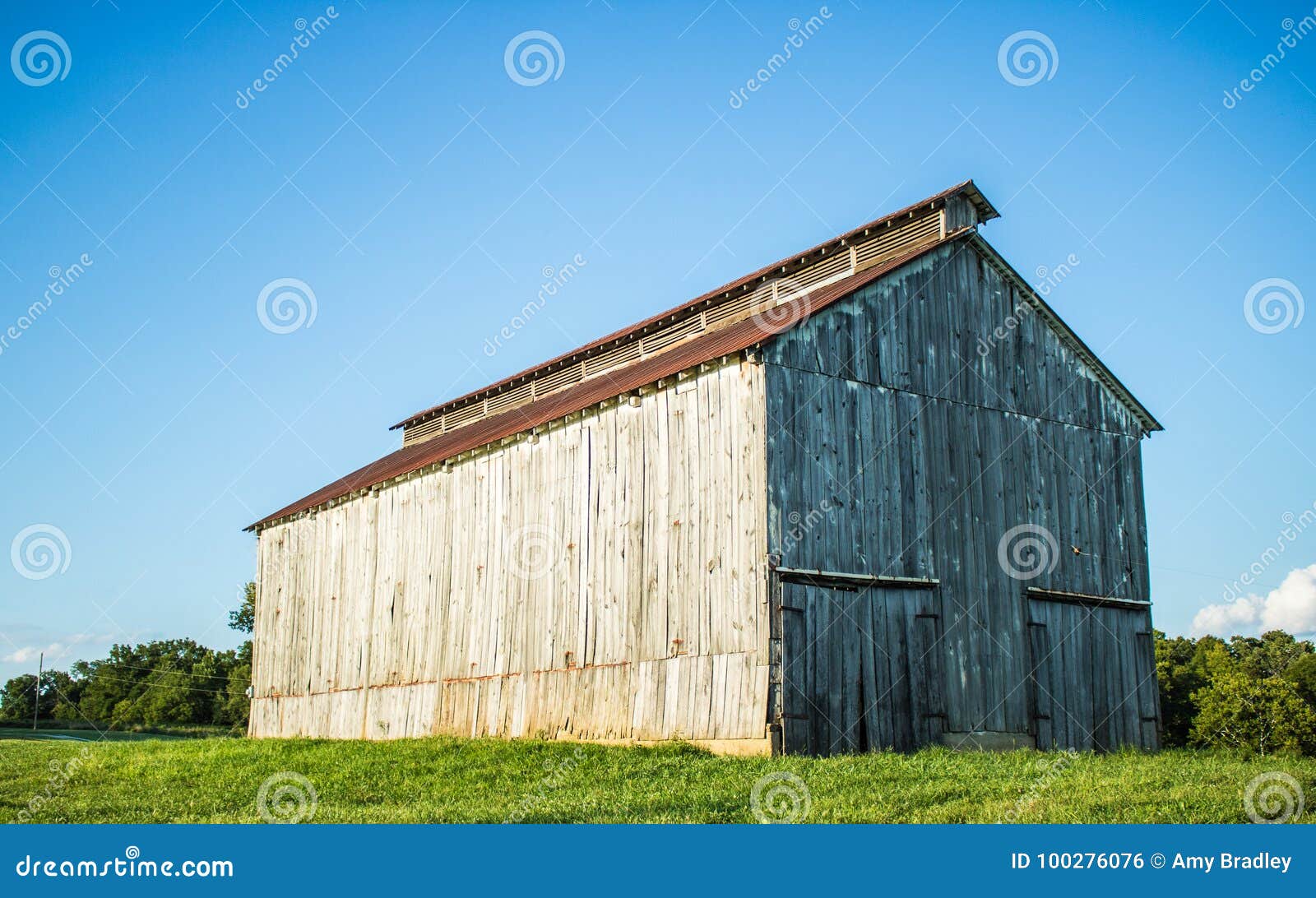 Long Side of White Barn stock photo. Image of farm, green - 100276076