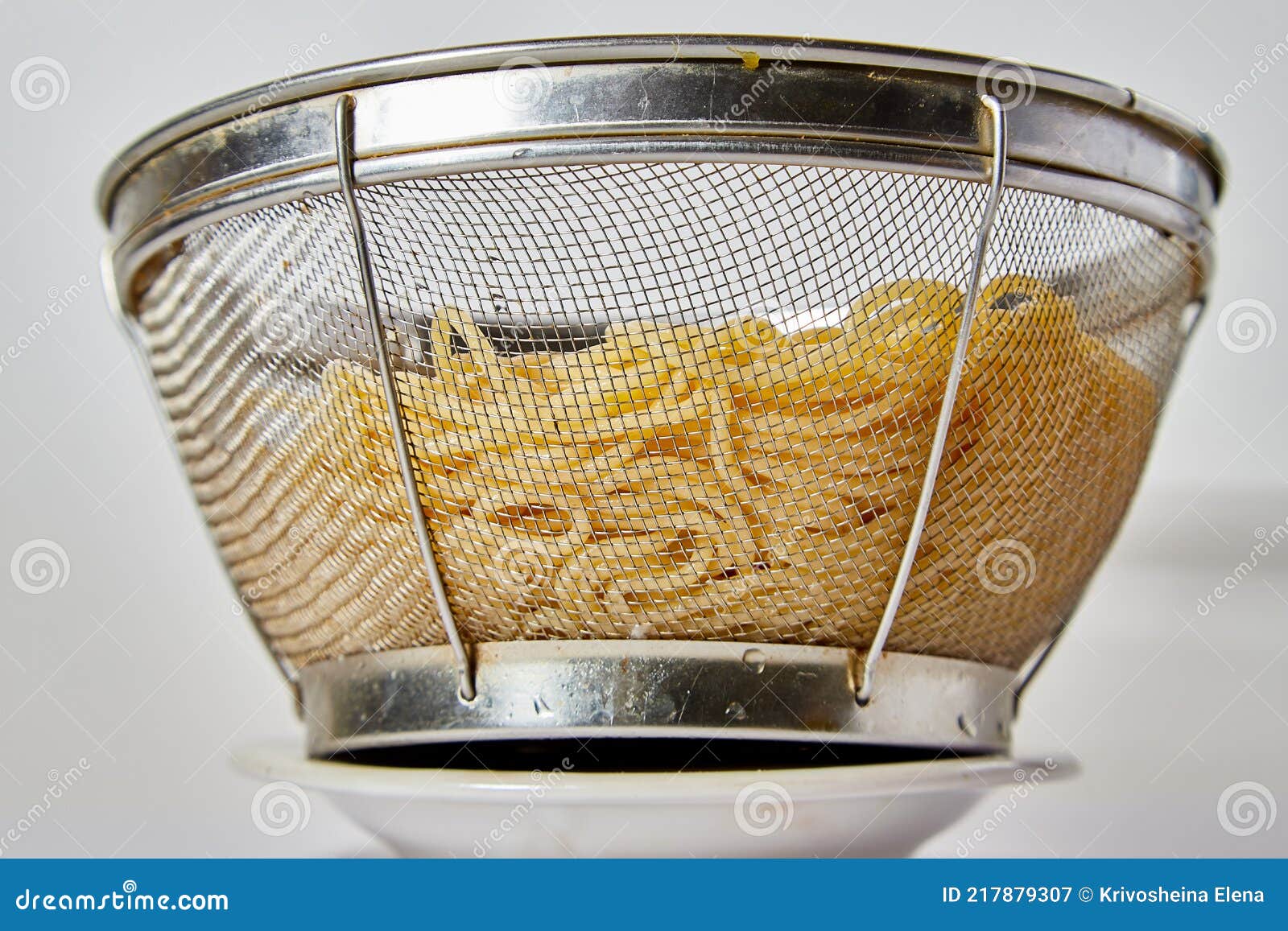 Long Spaghetti in an Iron Colander on a White Background Stock Image ...