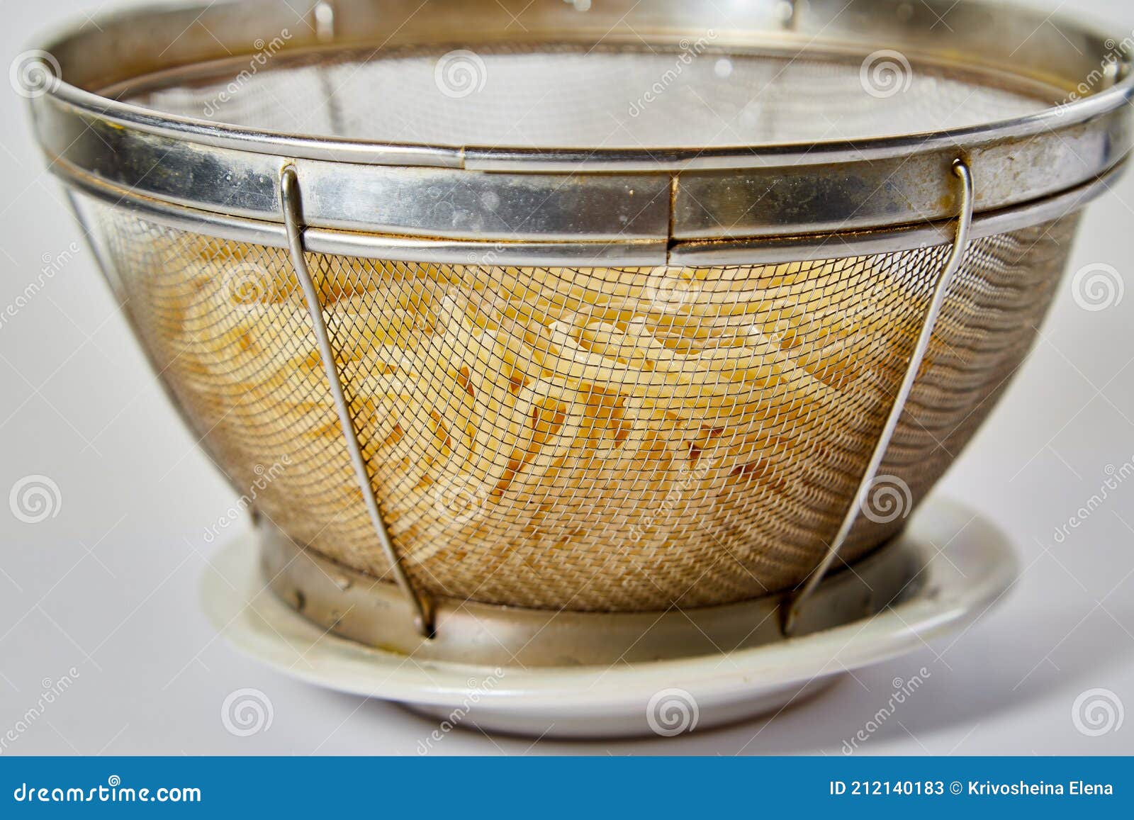 Long Spaghetti in an Iron Colander on a White Background Stock Image ...