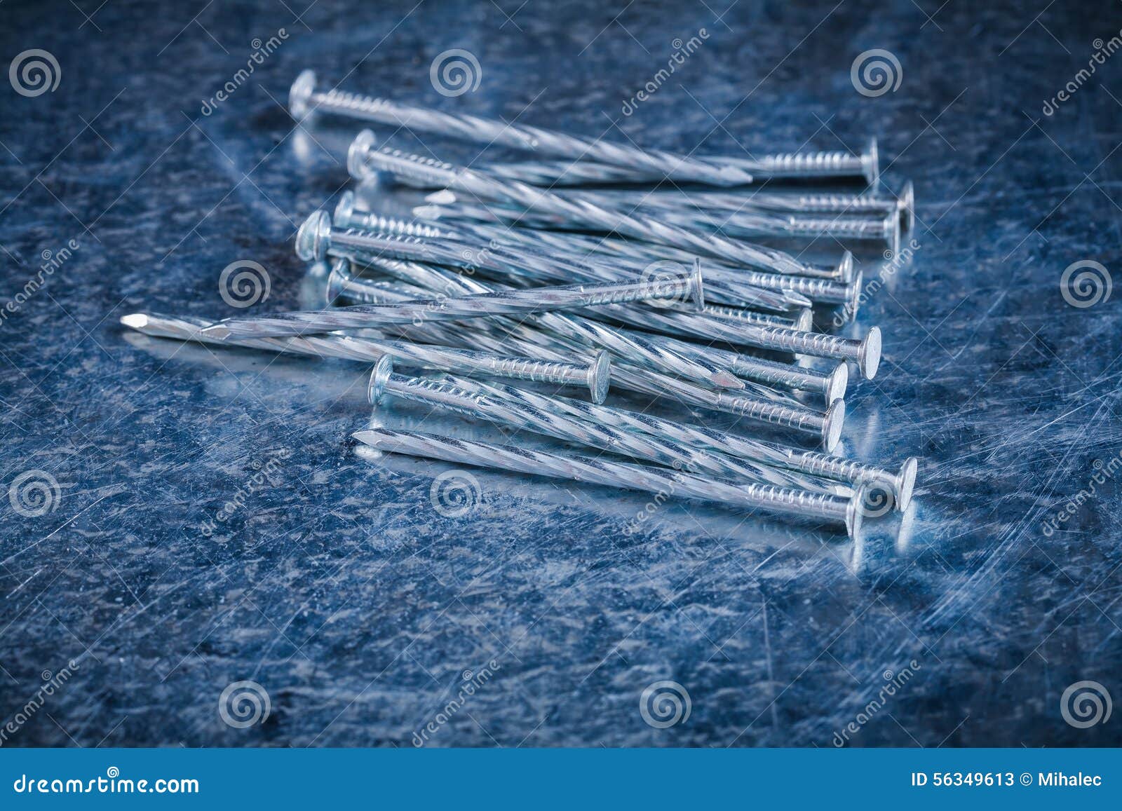 Long Stainless Construction Nails on Scratched Stock Image - Image of ...
