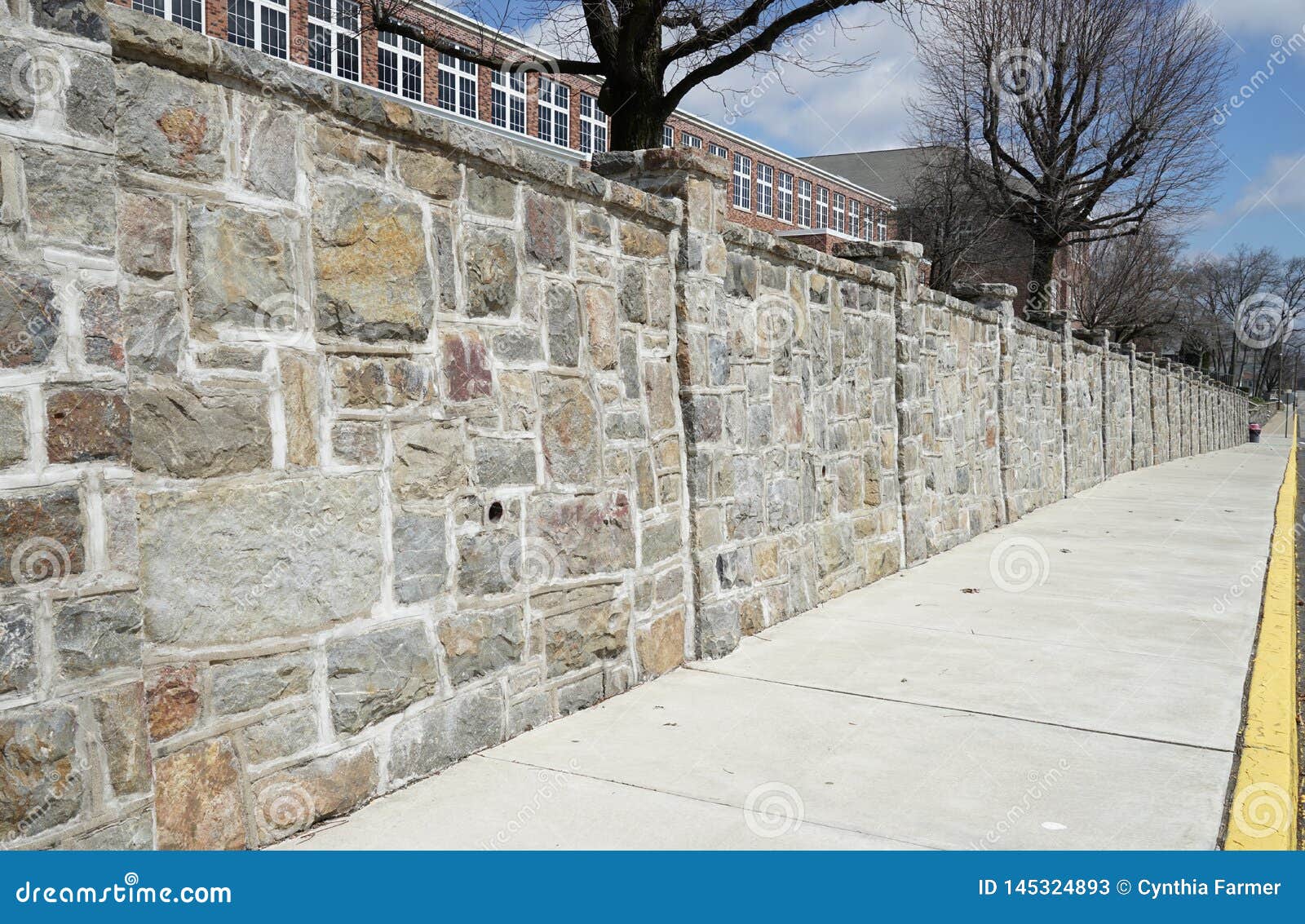 Long stone wall stock image. Image of wall, long, cement - 145324893