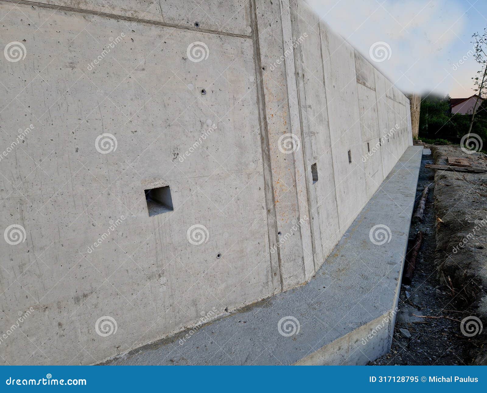 Long Straight Supporting Wall of Cast Cement Mixer Formwork. Behind ...