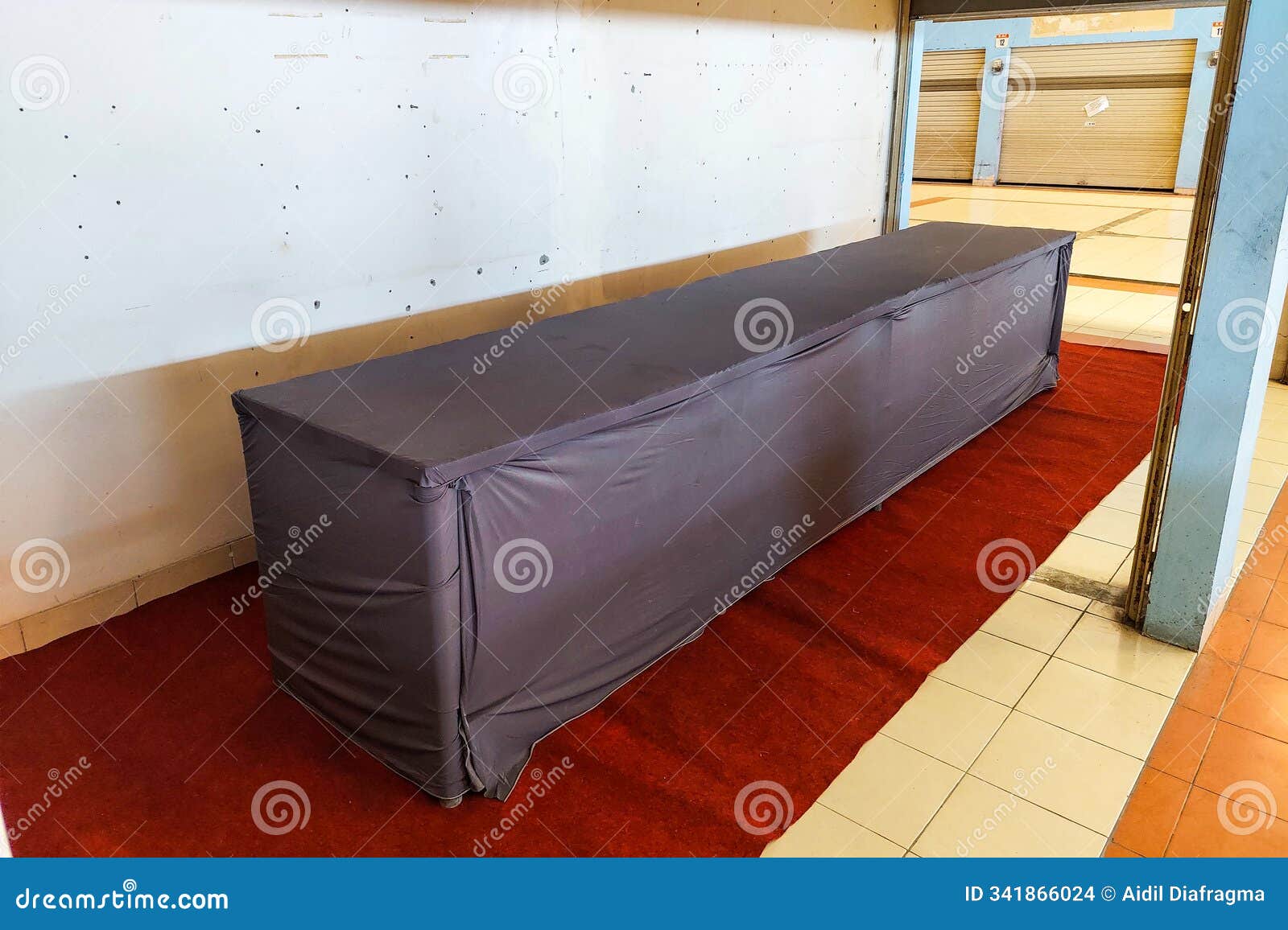Long Table on the Floor with a Deep Red Mat, Room Stock Photo - Image ...