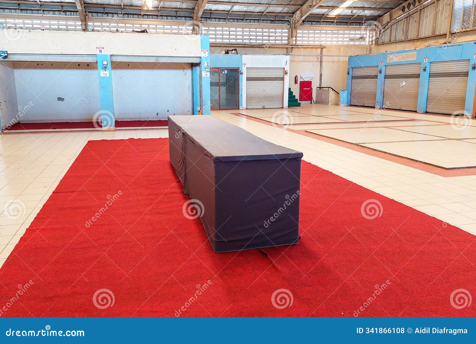 Long Table on the Floor with a Deep Red Mat, Room Stock Photo - Image ...