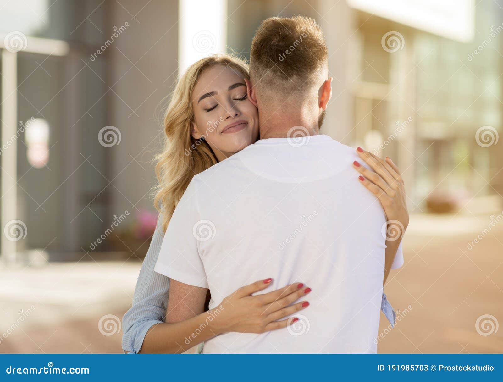 Affectionate Couple Cuddling, Walking Down the Streets Stock Image ...
