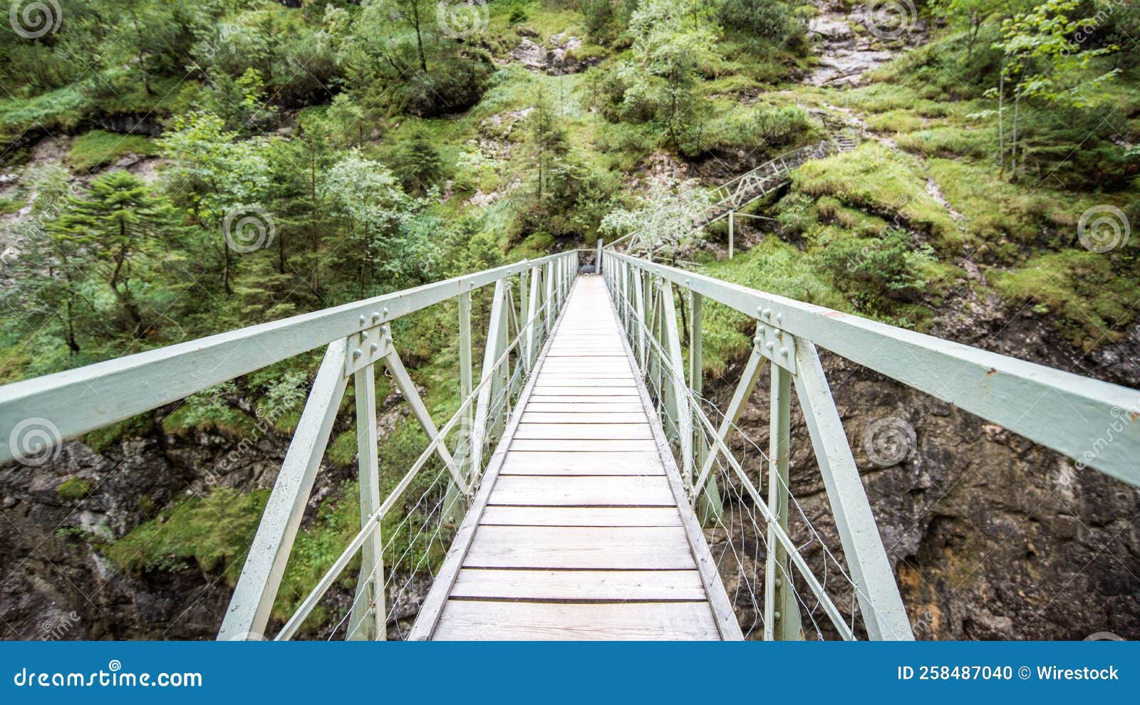 Long White Bridge on a Green Mountain Stock Photo - Image of path ...