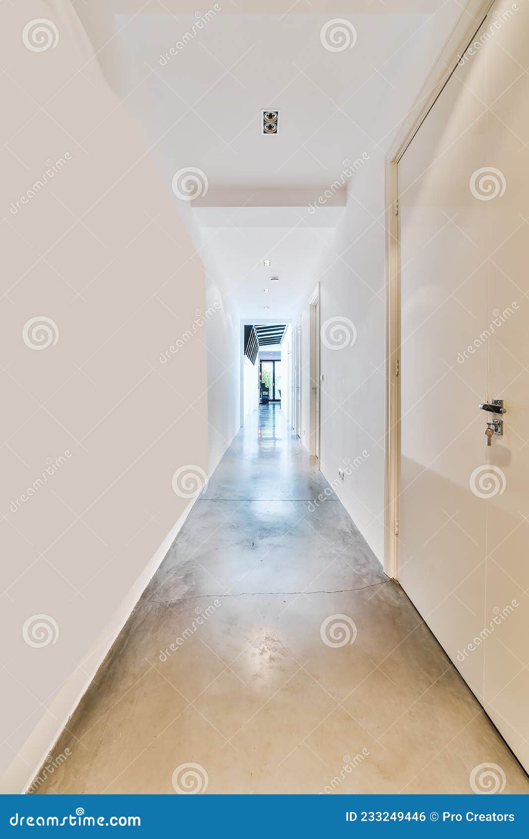A long white corridor stock photo. Image of style, house - 233249446