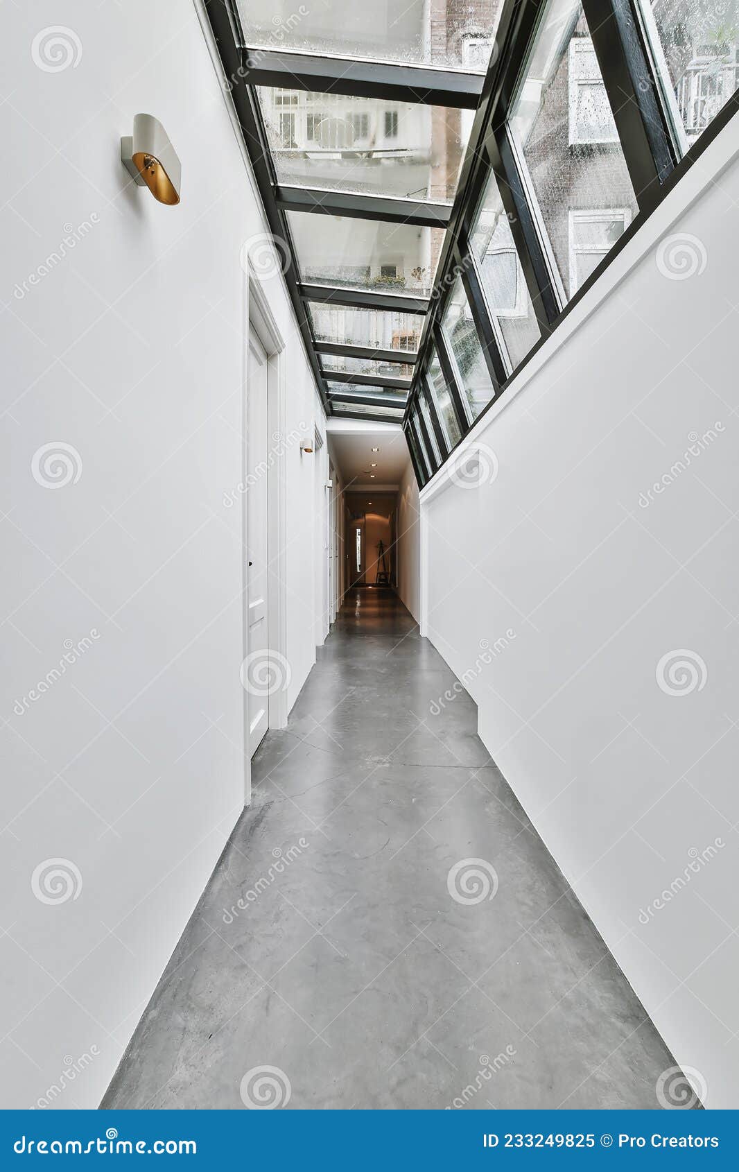 A long white corridor stock image. Image of estate, comfortable - 233249825