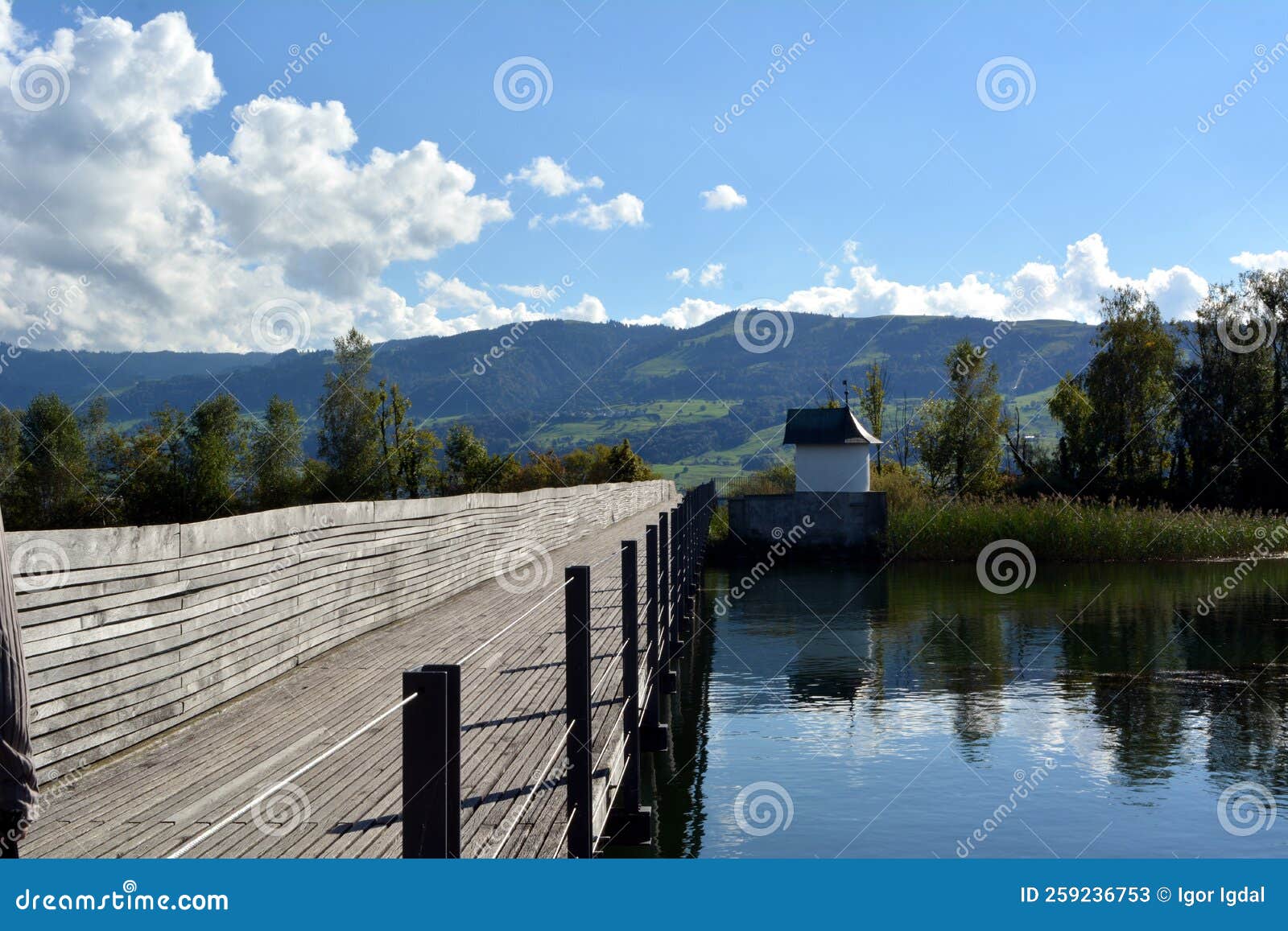 Long Wooden Bridge Over the River Stock Image - Image of road, foliage ...