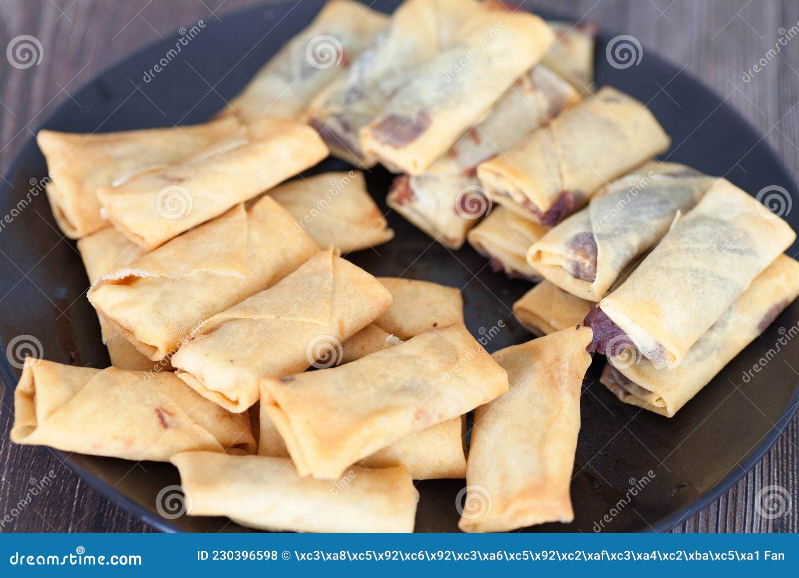 Look Down at the Golden Spring Rolls on the Plate on the Table Stock ...