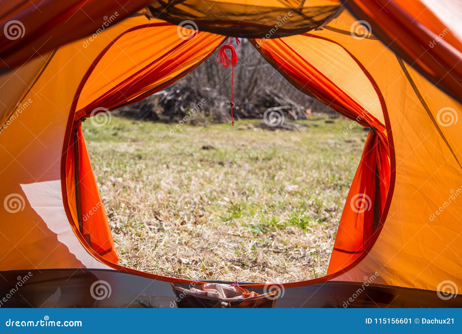 A Look through the Entrance of the Tent. Orange Camping Tent in an ...