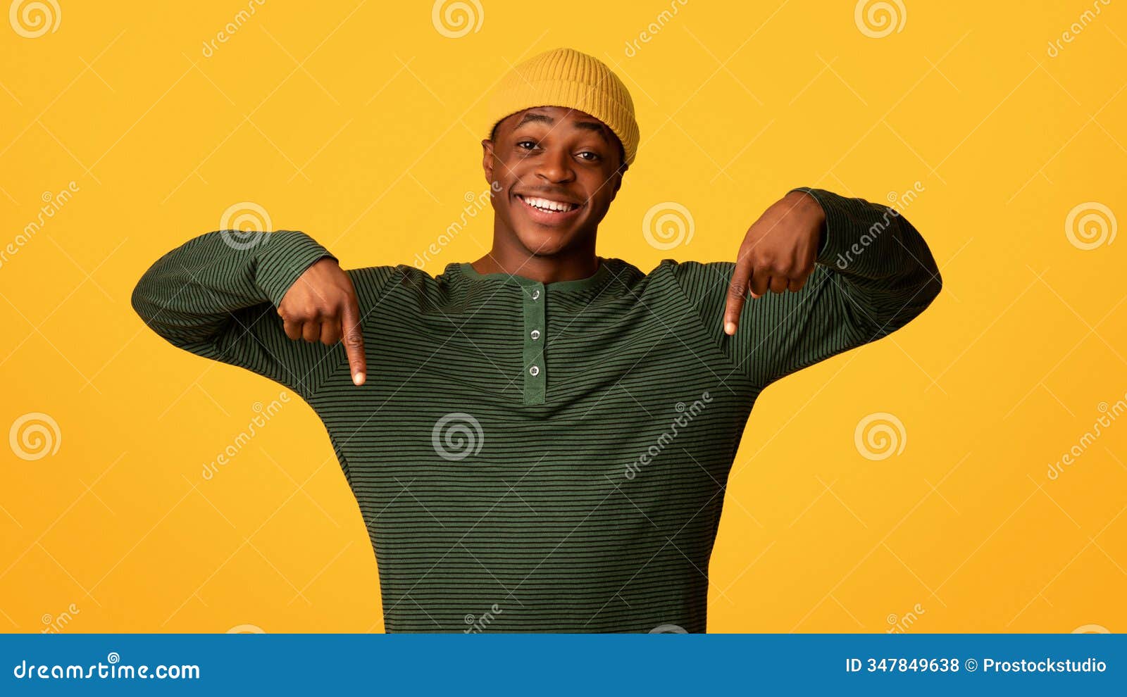 Look at this. Excited Black Guy Pointing Down with Two Hands Stock ...