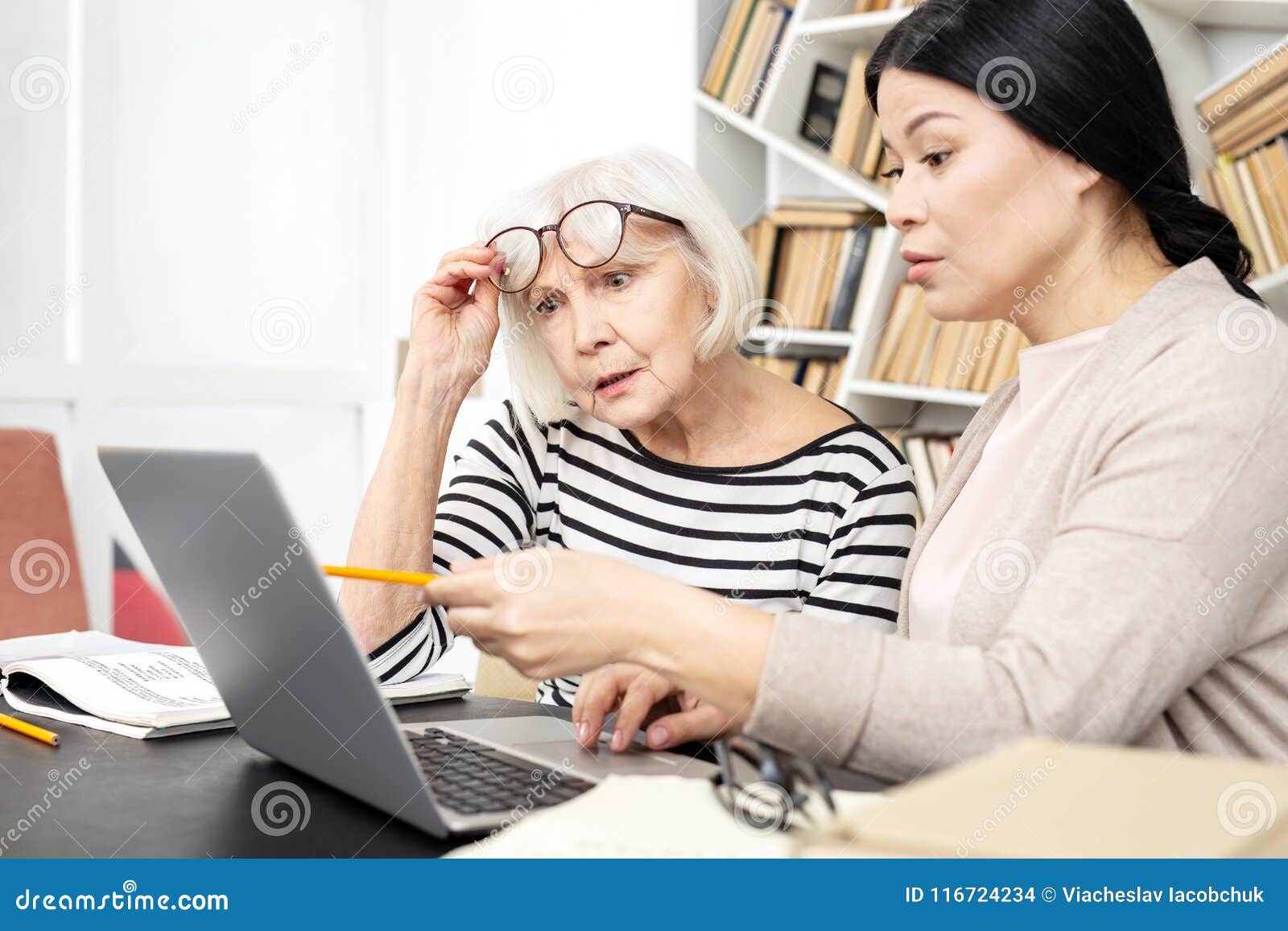 Professional Female Tutor Explaining Task Stock Photo - Image of asian ...