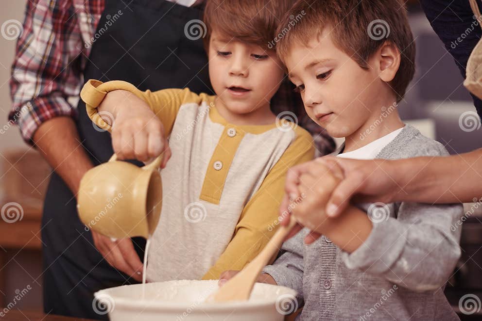 Look at How Great Im Doing. Two Young Brothers Baking in the Kitchen ...
