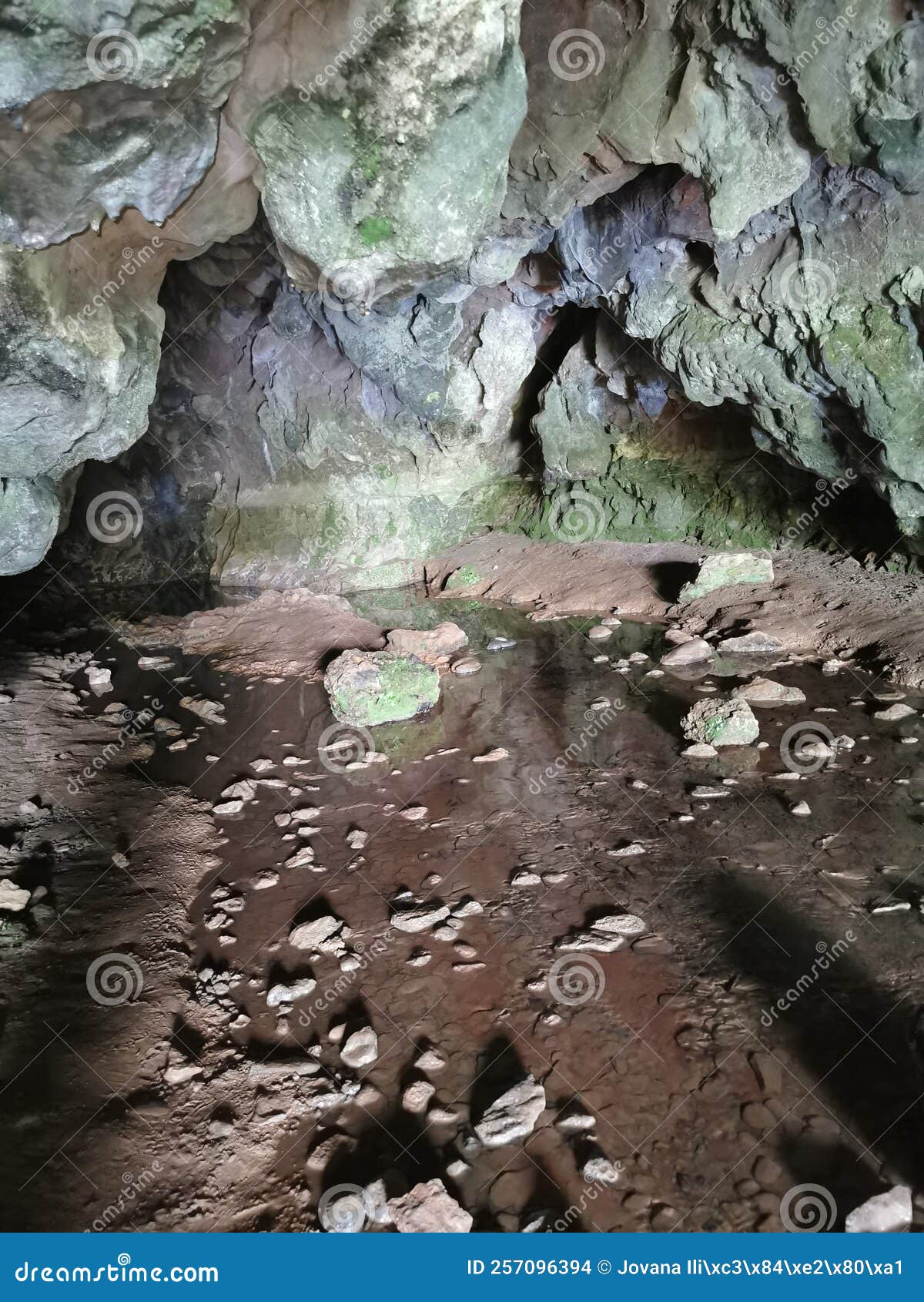 Look inside this cave stock photo. Image of wadi, water - 257096394