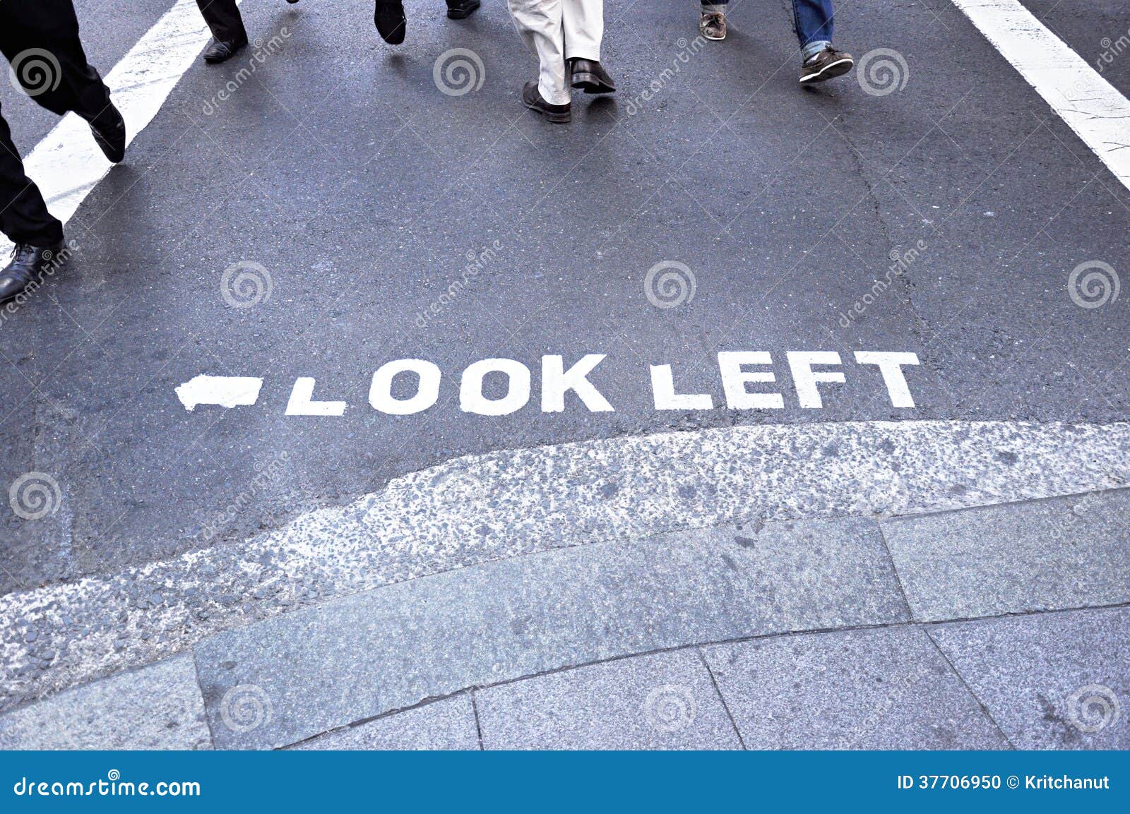 LOOK LEFT Sign on the Street Stock Photo - Image of safety, asphalt ...