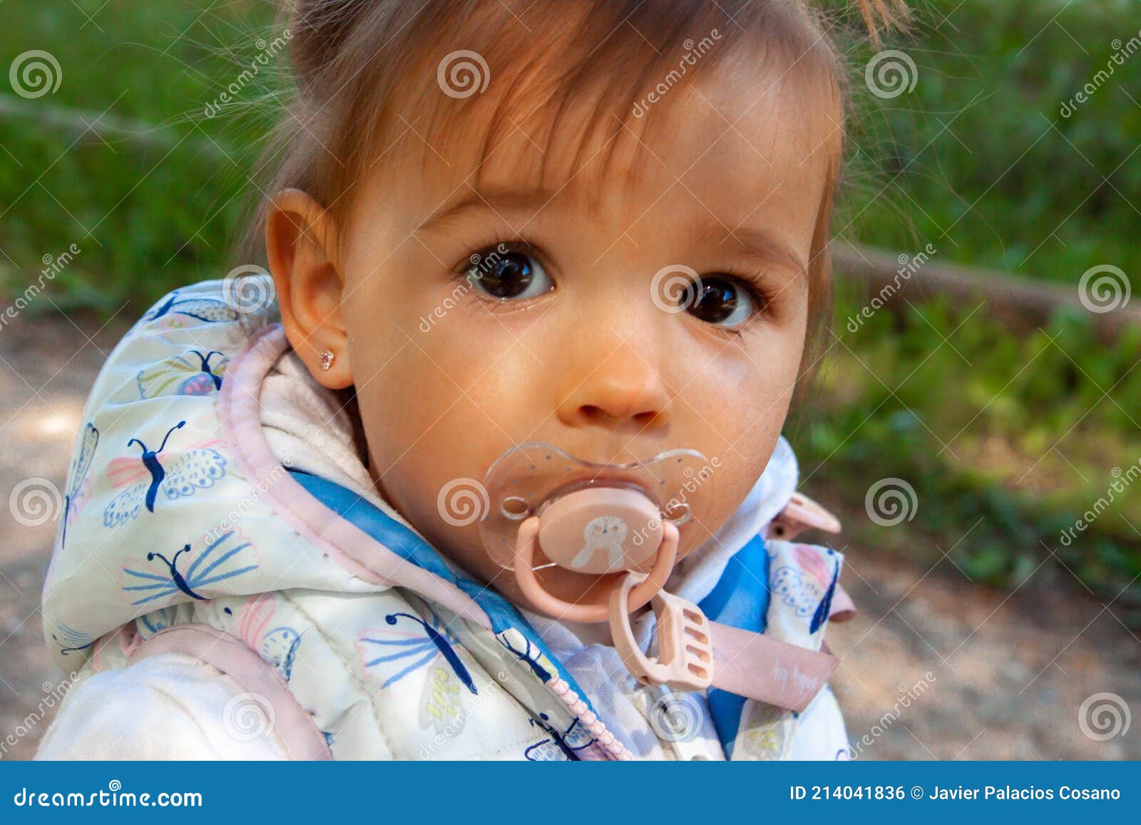 Look of a Little Girl with Her Pacifier Stock Photo - Image of ...