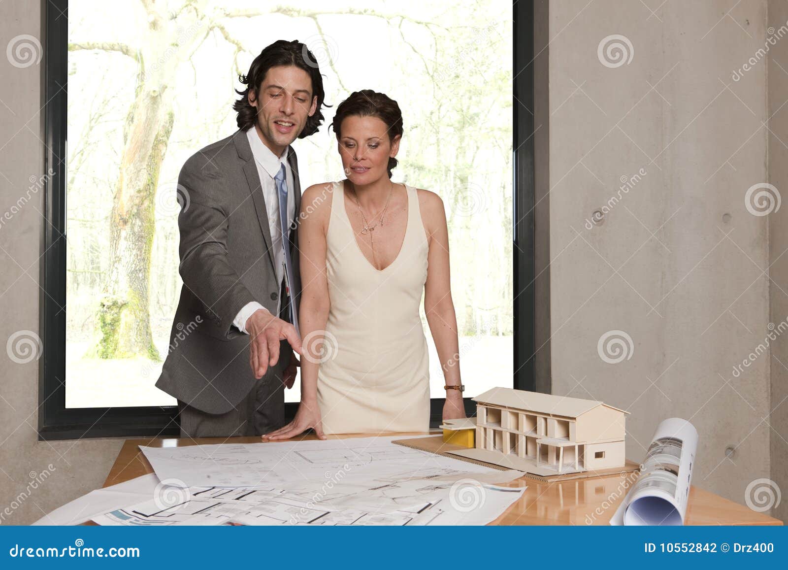 Look at our plans stock photo. Image of lovers, buildings - 10552842