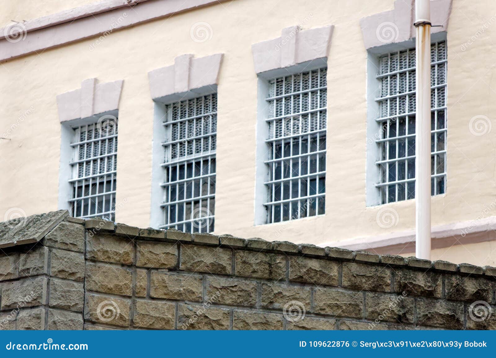 Windows of a Prison Building with Bars Stock Photo - Image of criminal ...