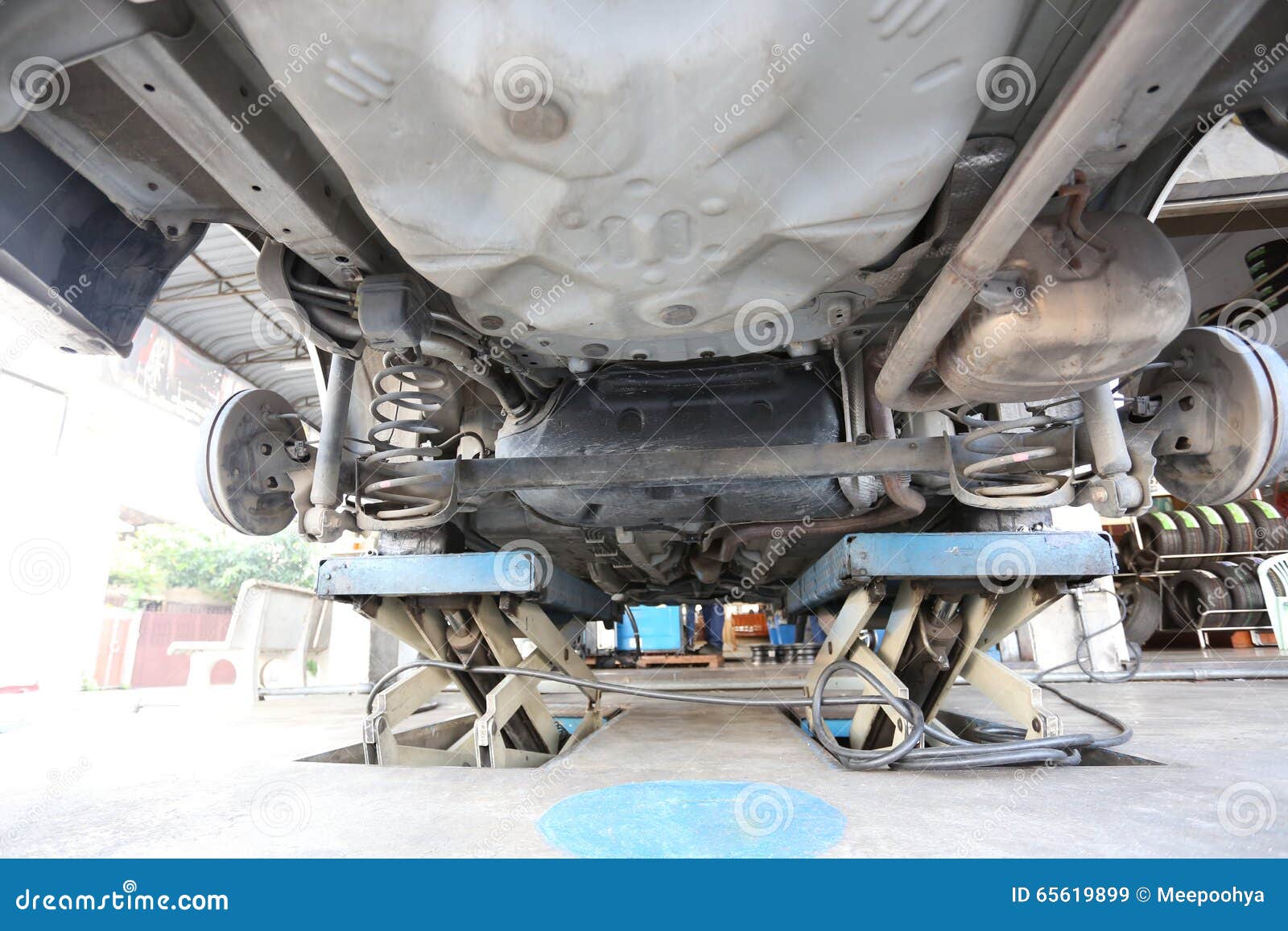 Look Under the Car at Inspection for Maintenance. Stock Image - Image ...