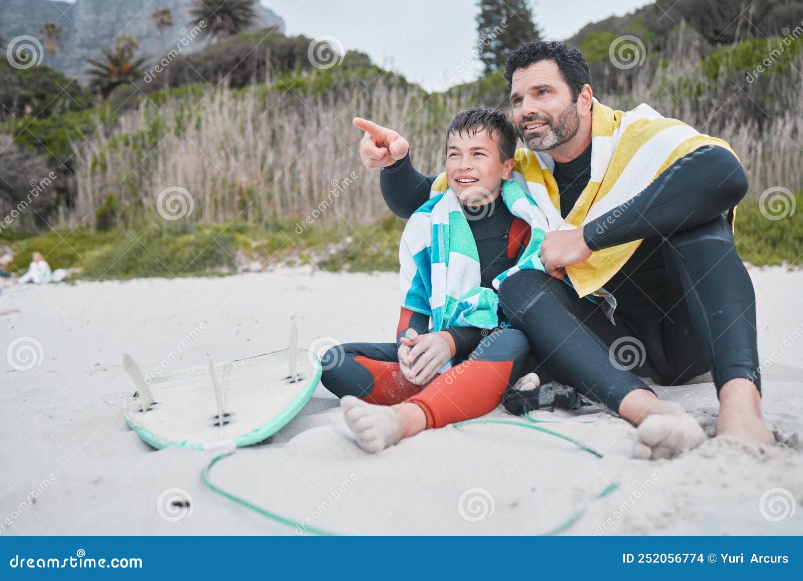 Look at that Wave, Dad. a Young Boy Out Surfing with His Father. Stock ...