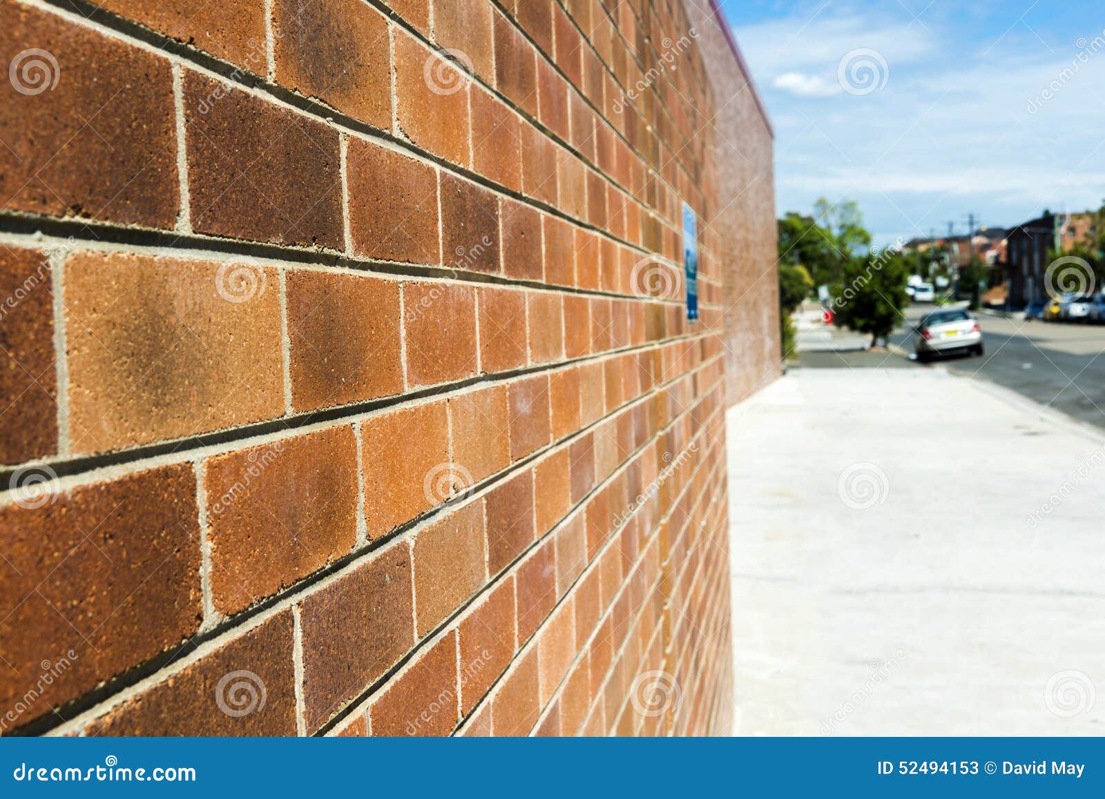 Looking along a Brick Wall stock image. Image of landscape - 52494153