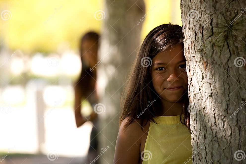 Looking behind a tree stock photo. Image of outdoors - 11595402