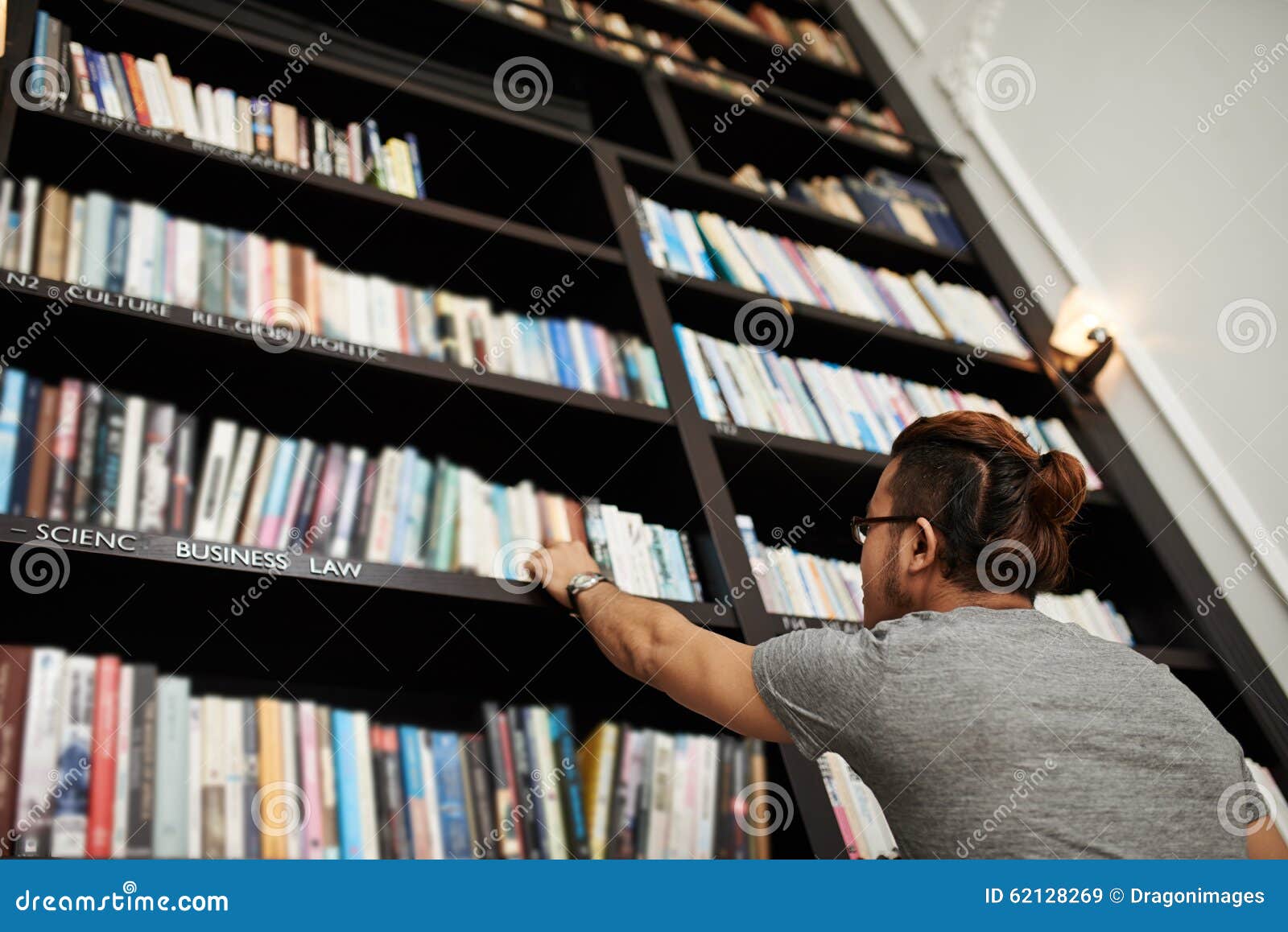Looking for book stock image. Image of library, interested - 62128269
