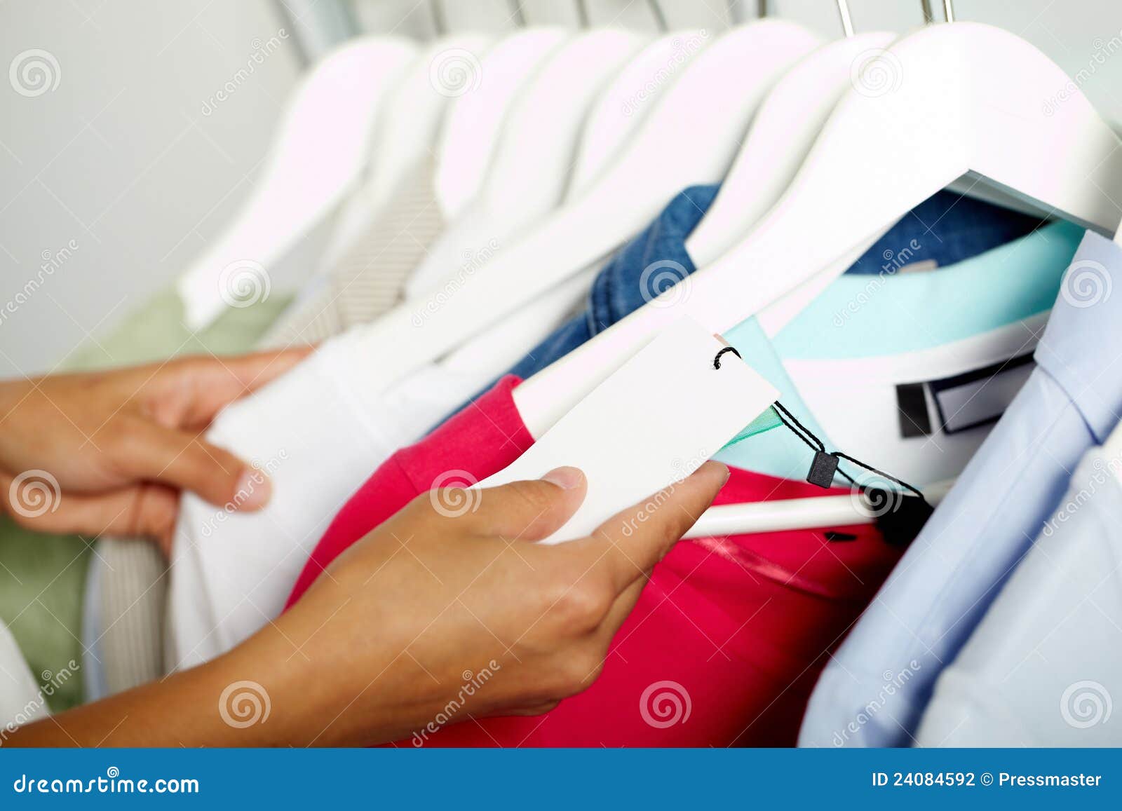 Looking for clothes stock photo. Image of mall, market - 24084592