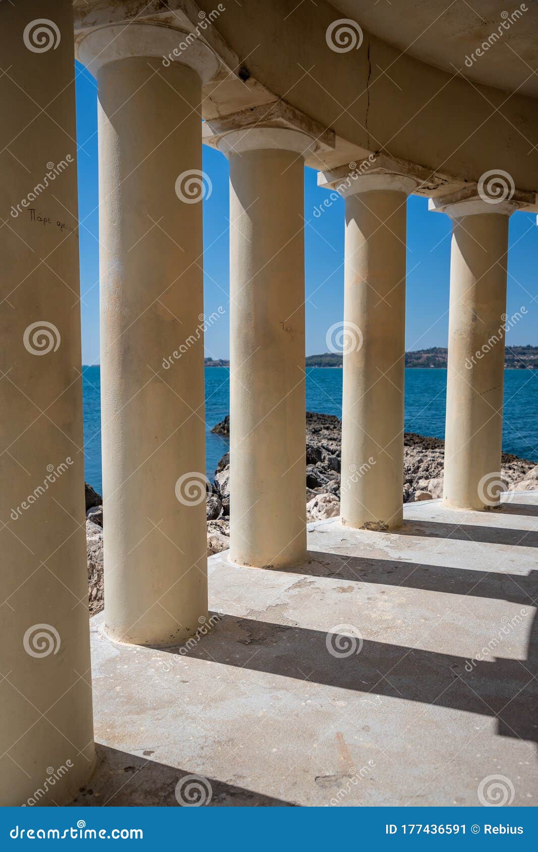 Looking through columns stock image. Image of cefallonia - 177436591