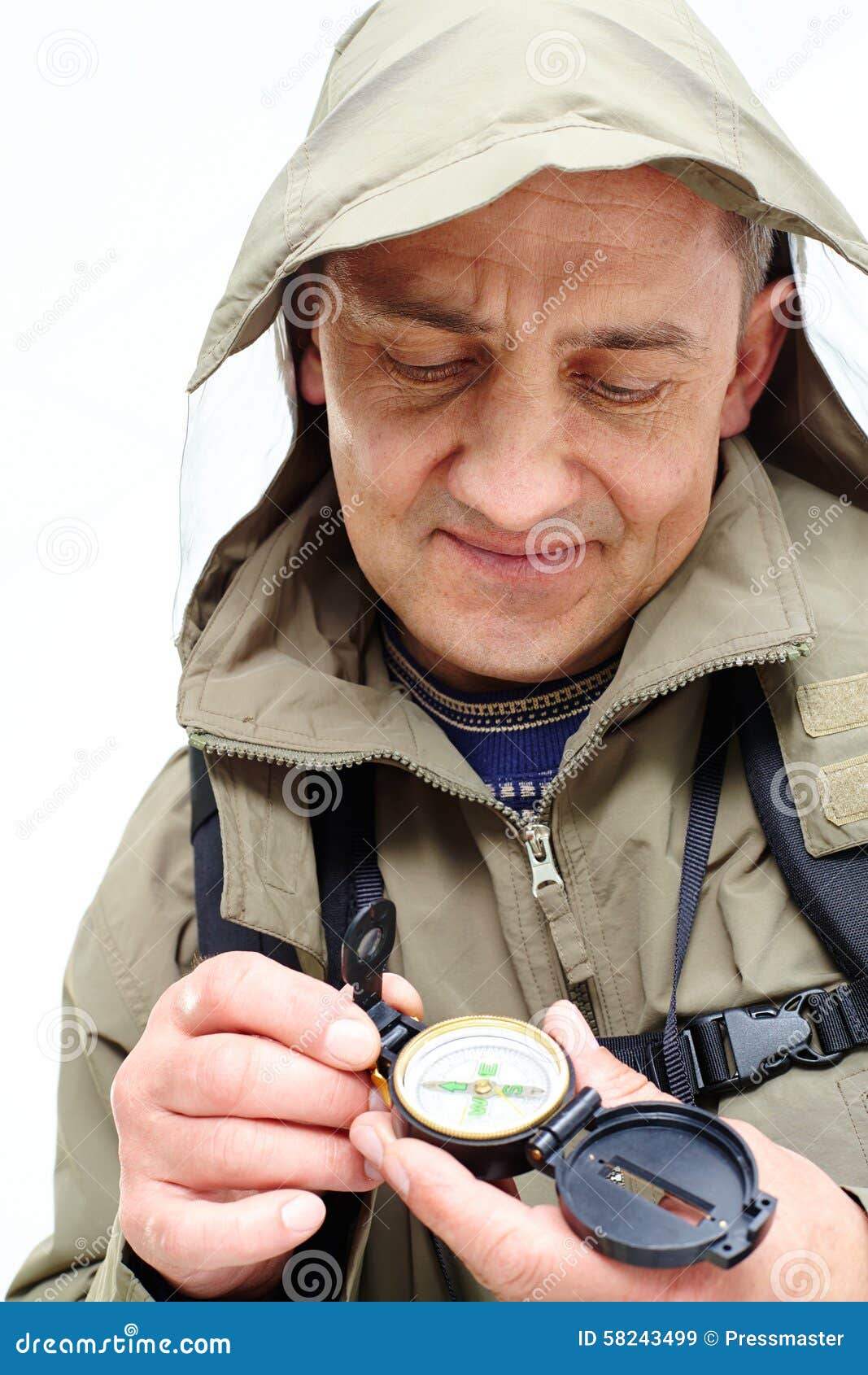 Looking at compass stock image. Image of hand, jacket - 58243499