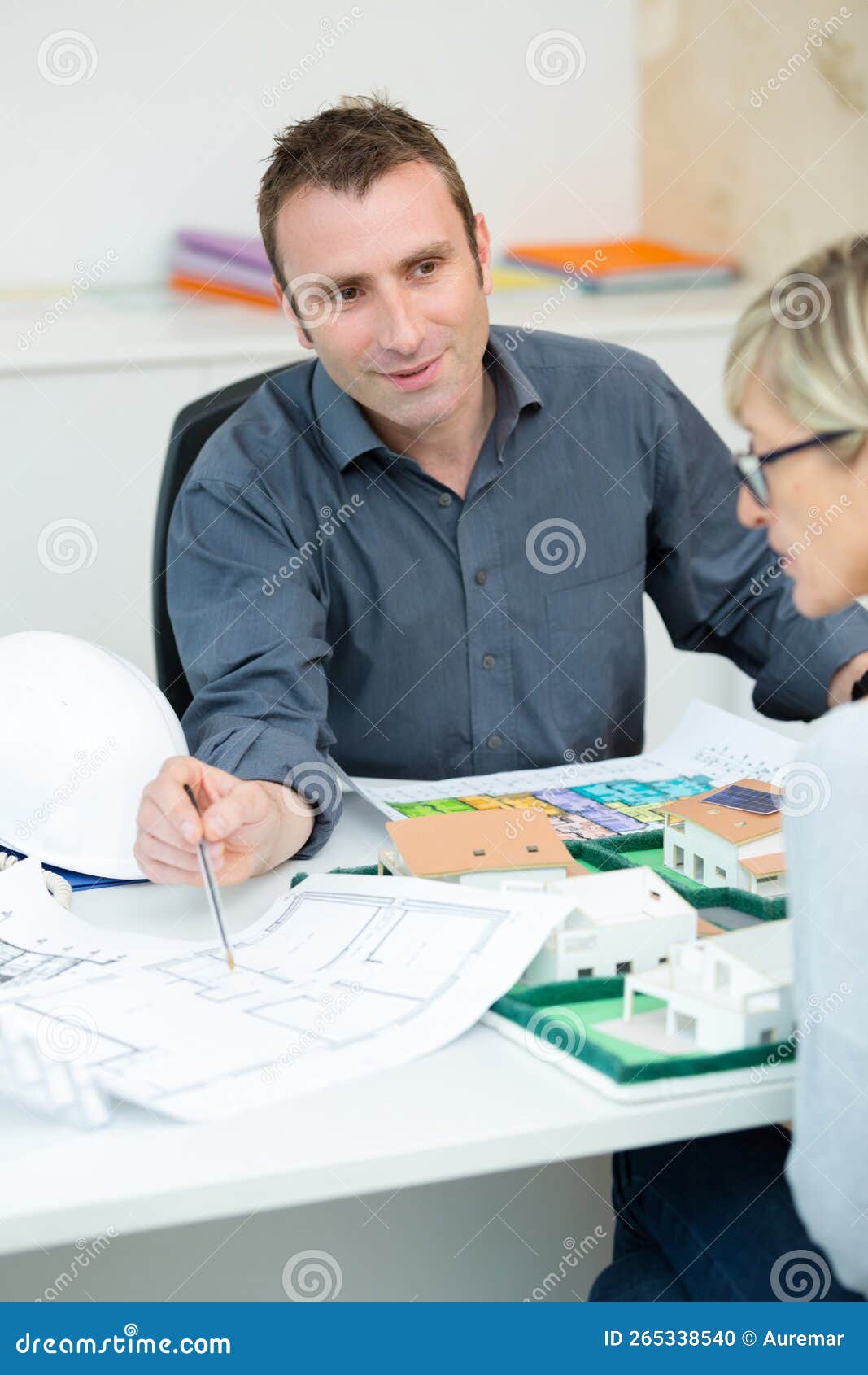 Looking at Construction Building Plans Stock Photo - Image of manager ...