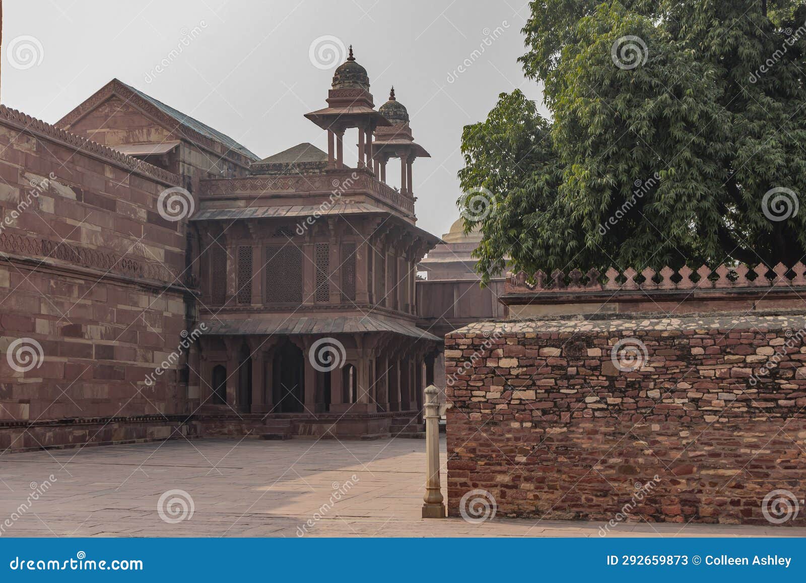 Looking Down an Alleyway at an Ancient Red Stone Building Stock Image ...