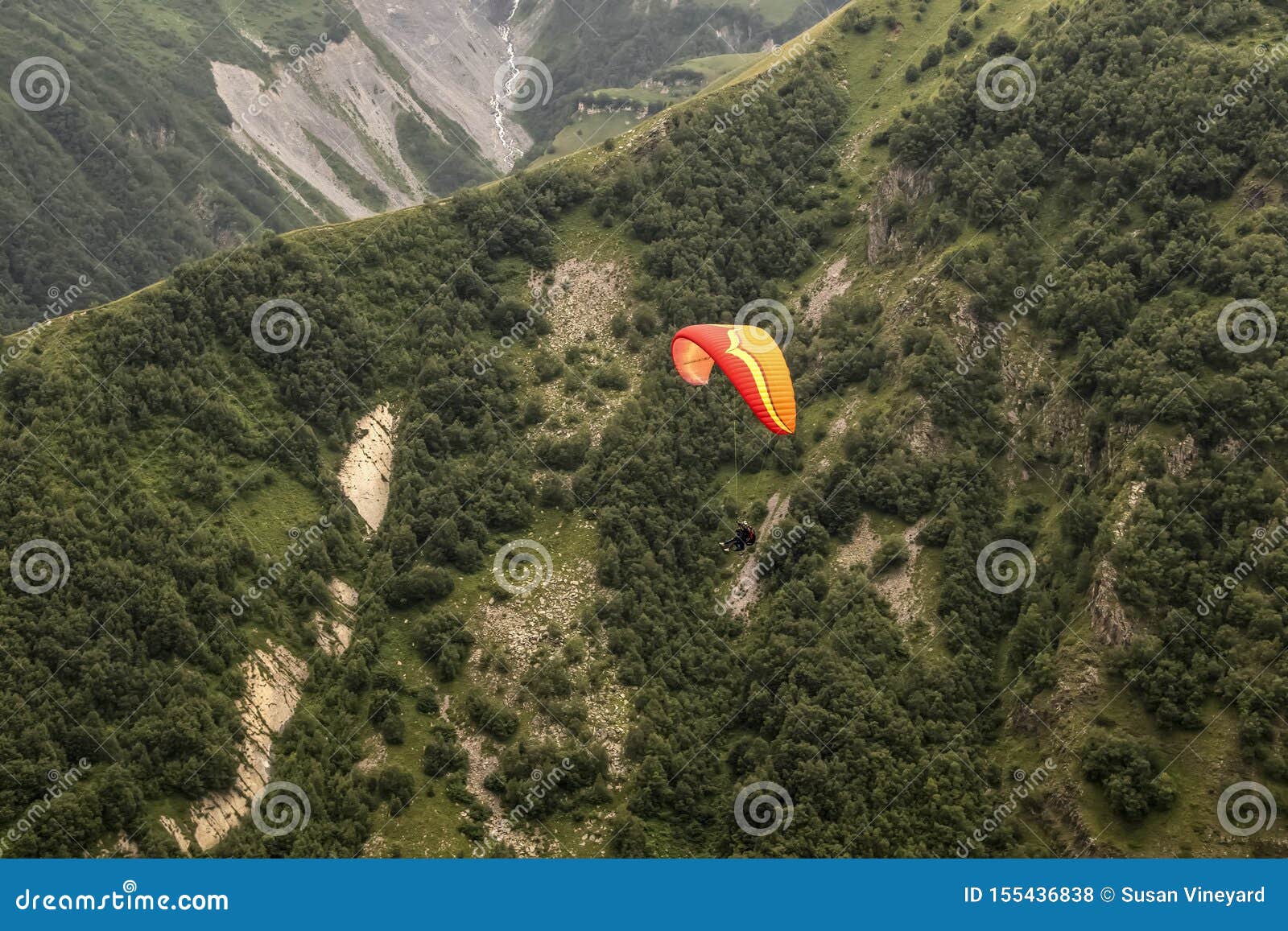 Looking Down at a Couple Hang Gliding High Over the Lower Caucasus ...