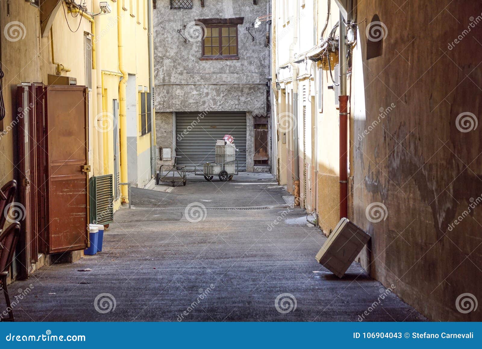 Looking Down a Long Dark Back Alley. Stock Image - Image of dark, empty ...