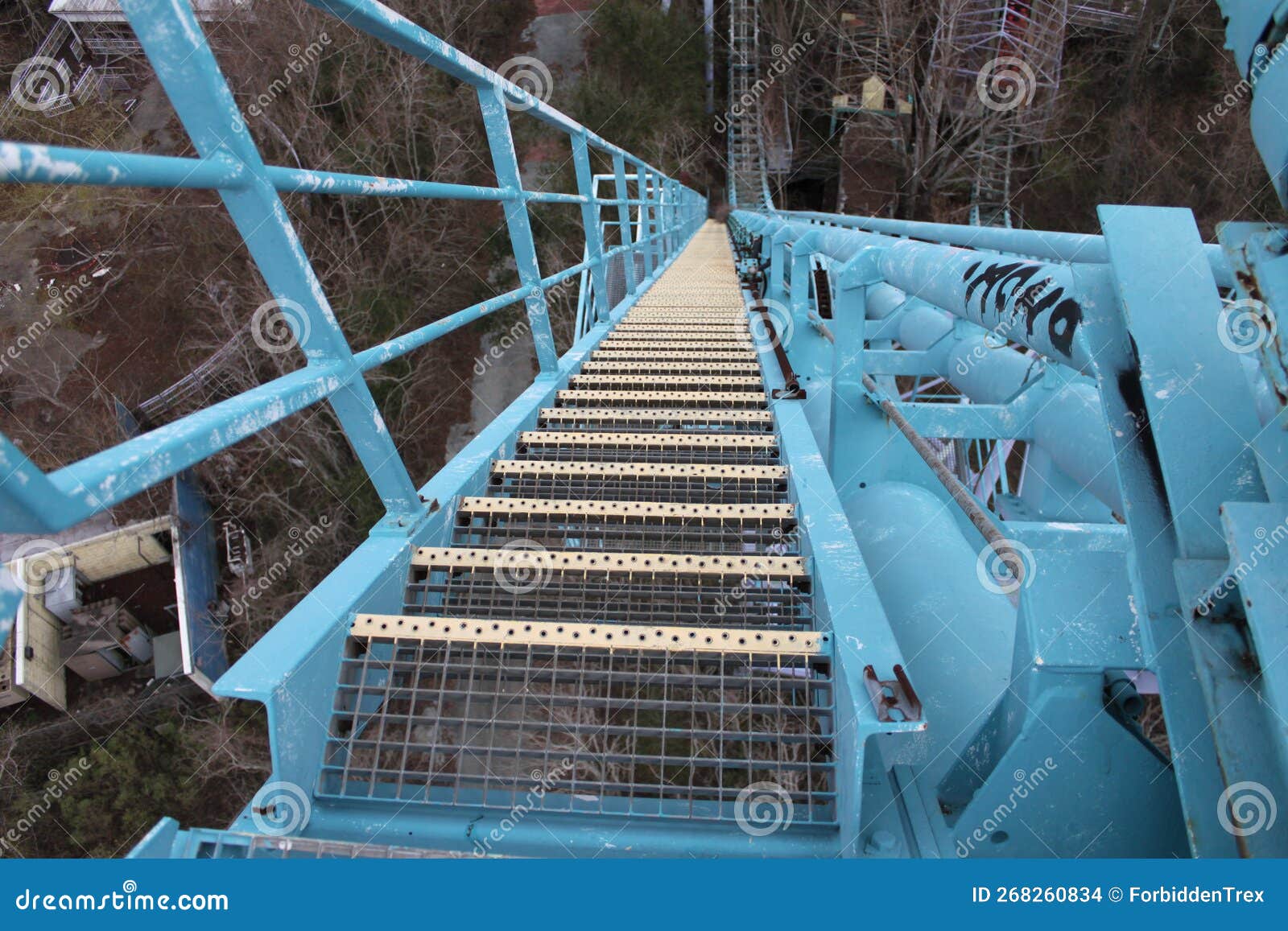 Looking Down Stairs from Top of Abandoned Blue Roller Coaster Stock ...