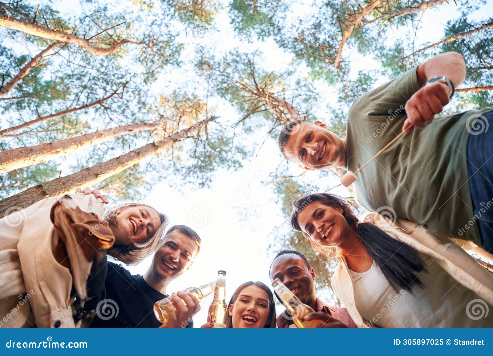 Looking Down. View from Below of Group of Friends that are in the ...