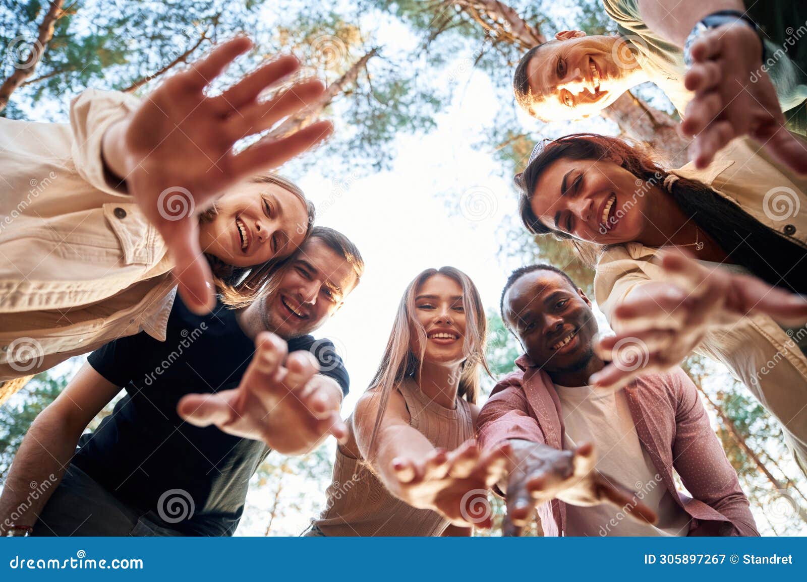 Looking Down. View from Below of Group of Friends that are in the ...