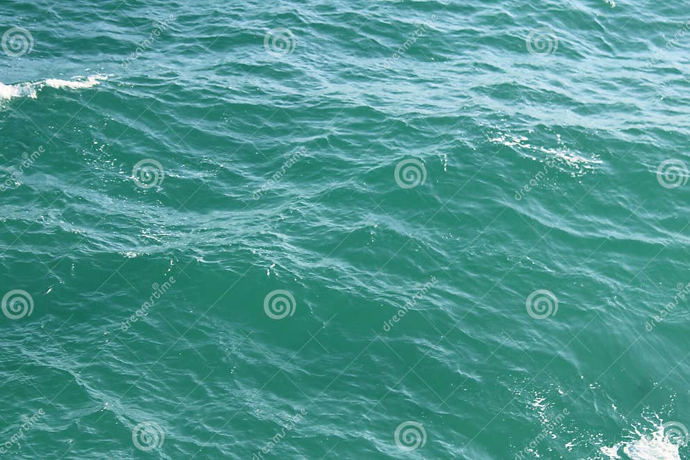 Looking Down at the Waters Surface with Water Ripples and Reflections ...