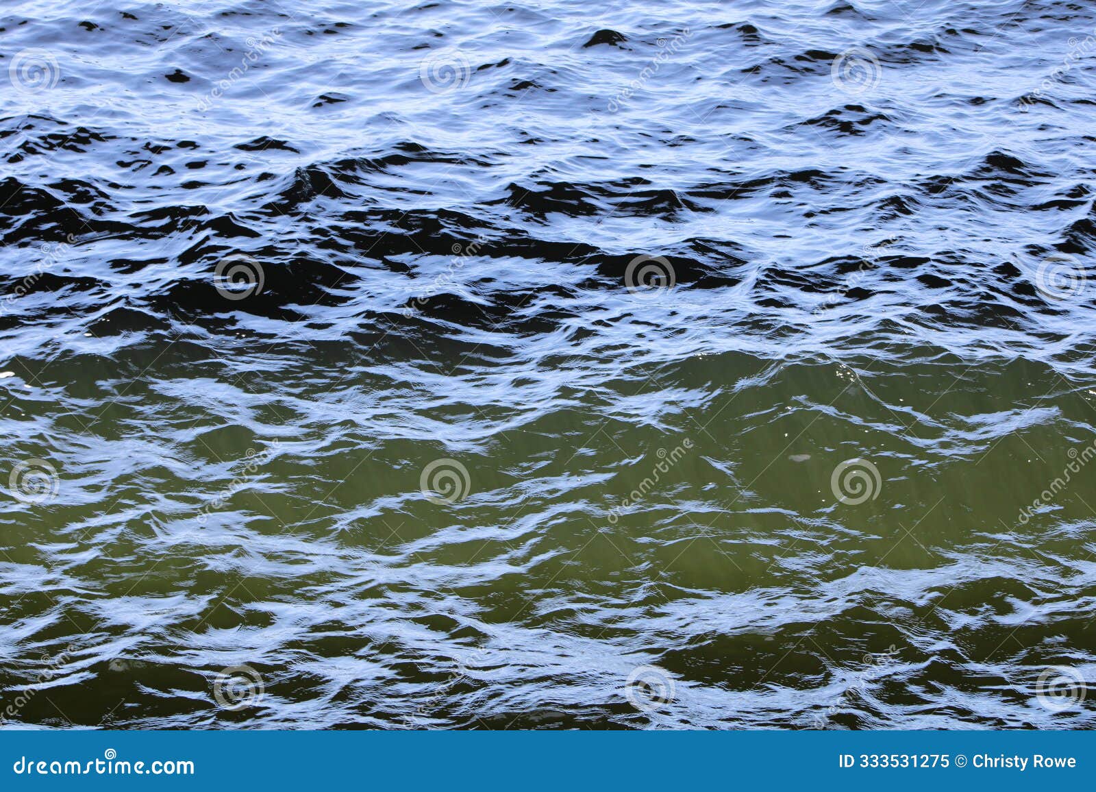 Looking Down at the Waters Surface with Water Ripples and Reflections ...