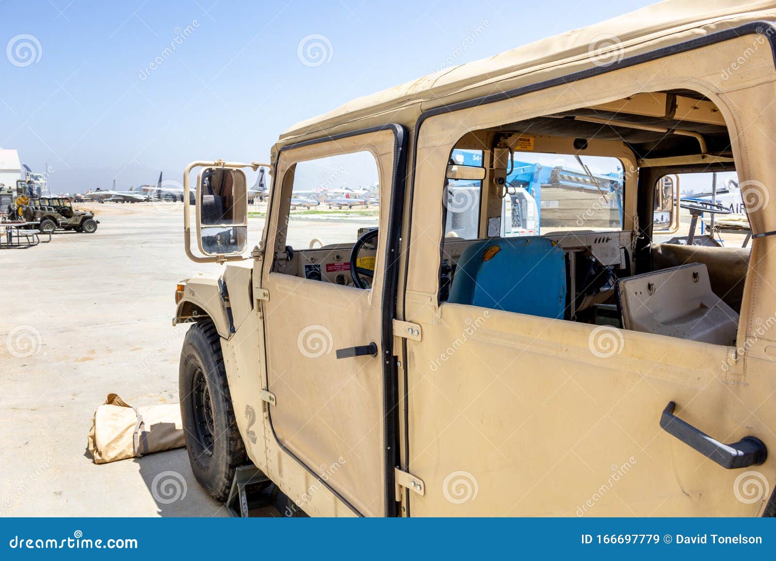 Humvee Military Tire Editorial Photo | CartoonDealer.com #166592599