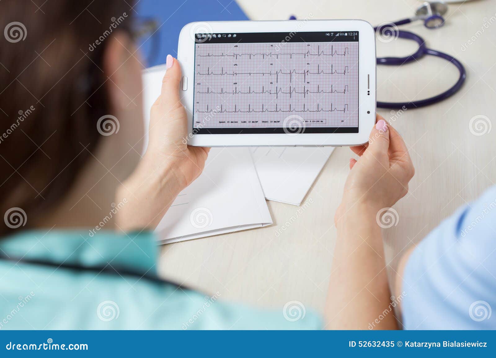 Looking at Electrocardiogram Stock Image - Image of medicine, looking ...