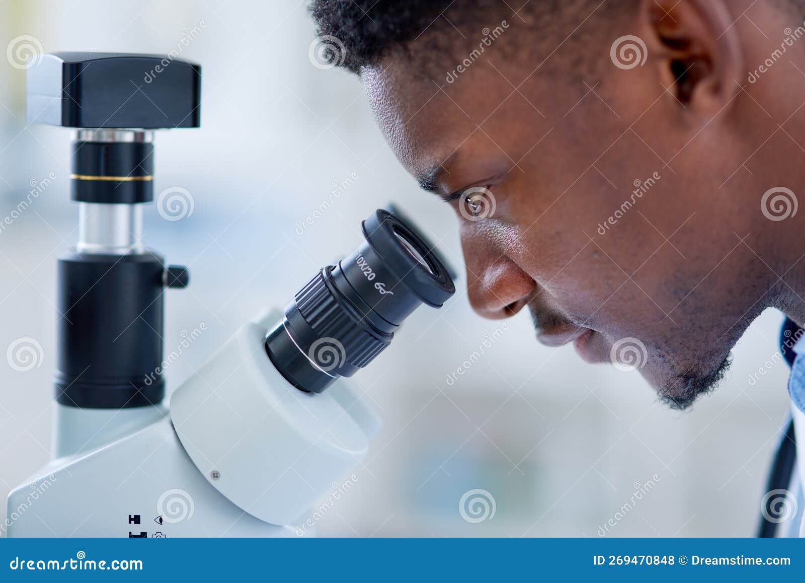Looking through the Eyes of the Lens. a Focused Young Male Scientist ...