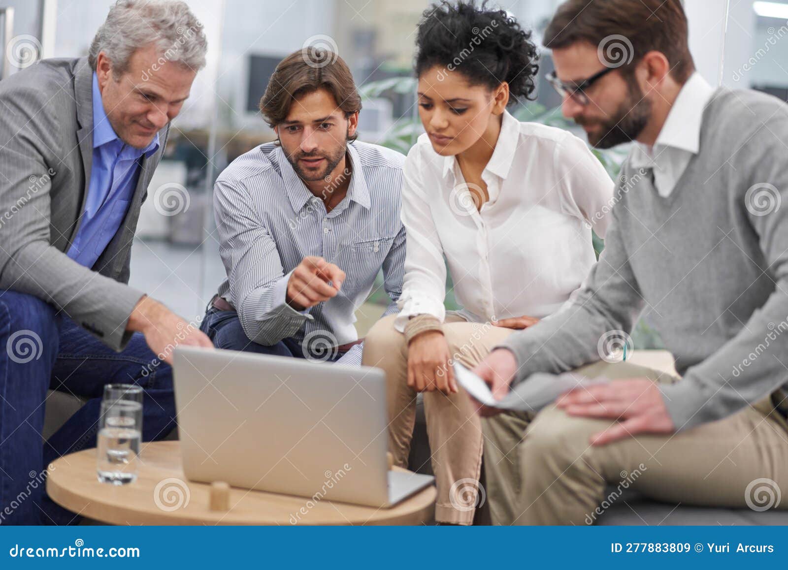 This is Looking Great. a Diverse Group of Office Professionals Talking ...