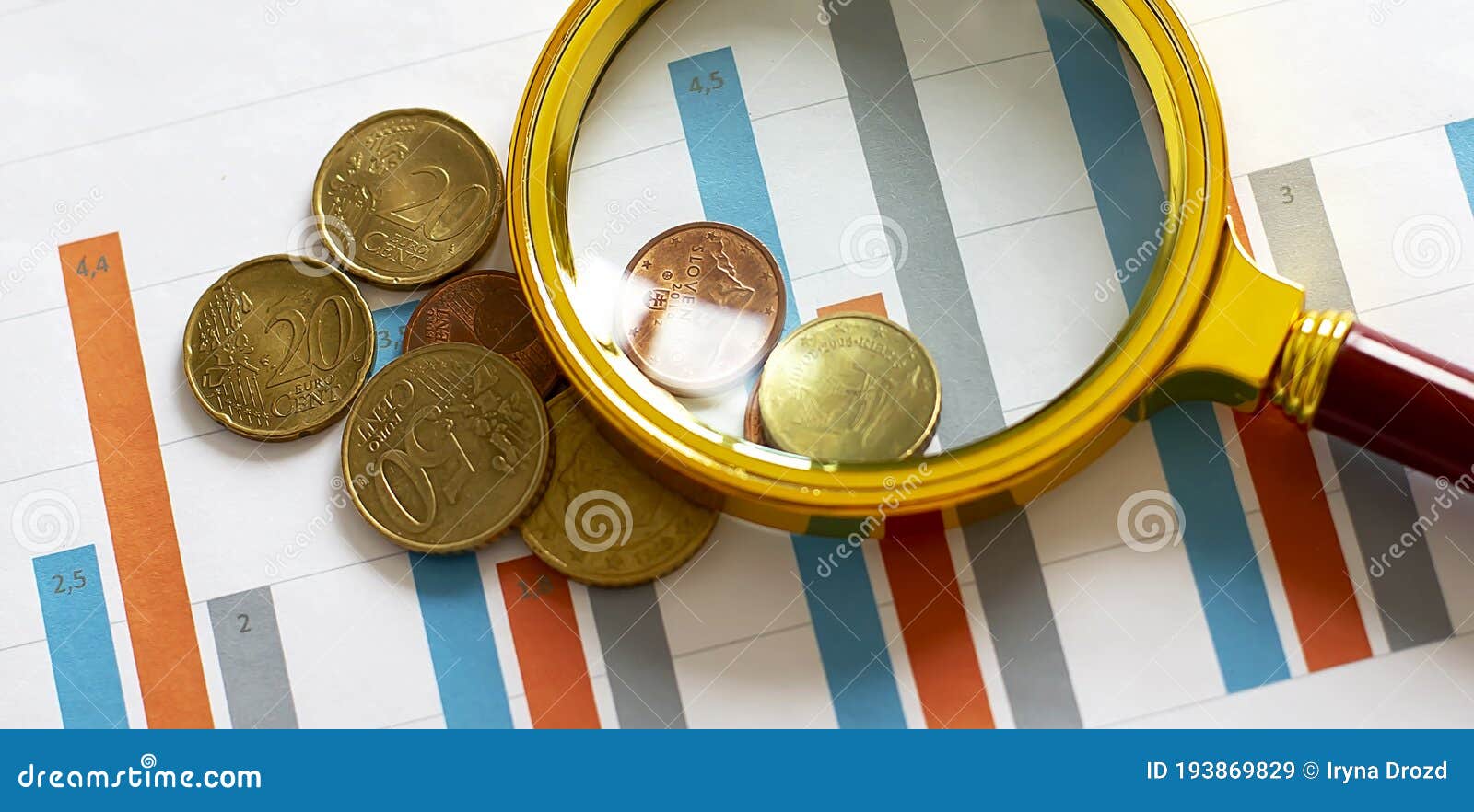 Looking at Growth Chart with Magnifying Glass and Coins. Graphs, Charts ...