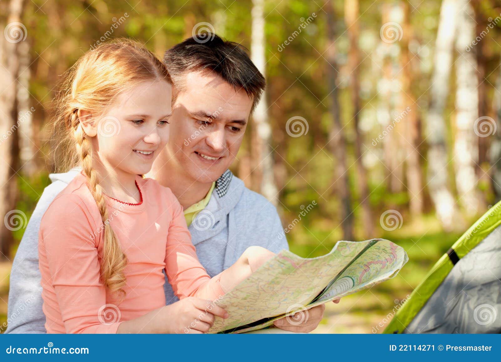 Looking at guide stock image. Image of daughter, camping - 22114271