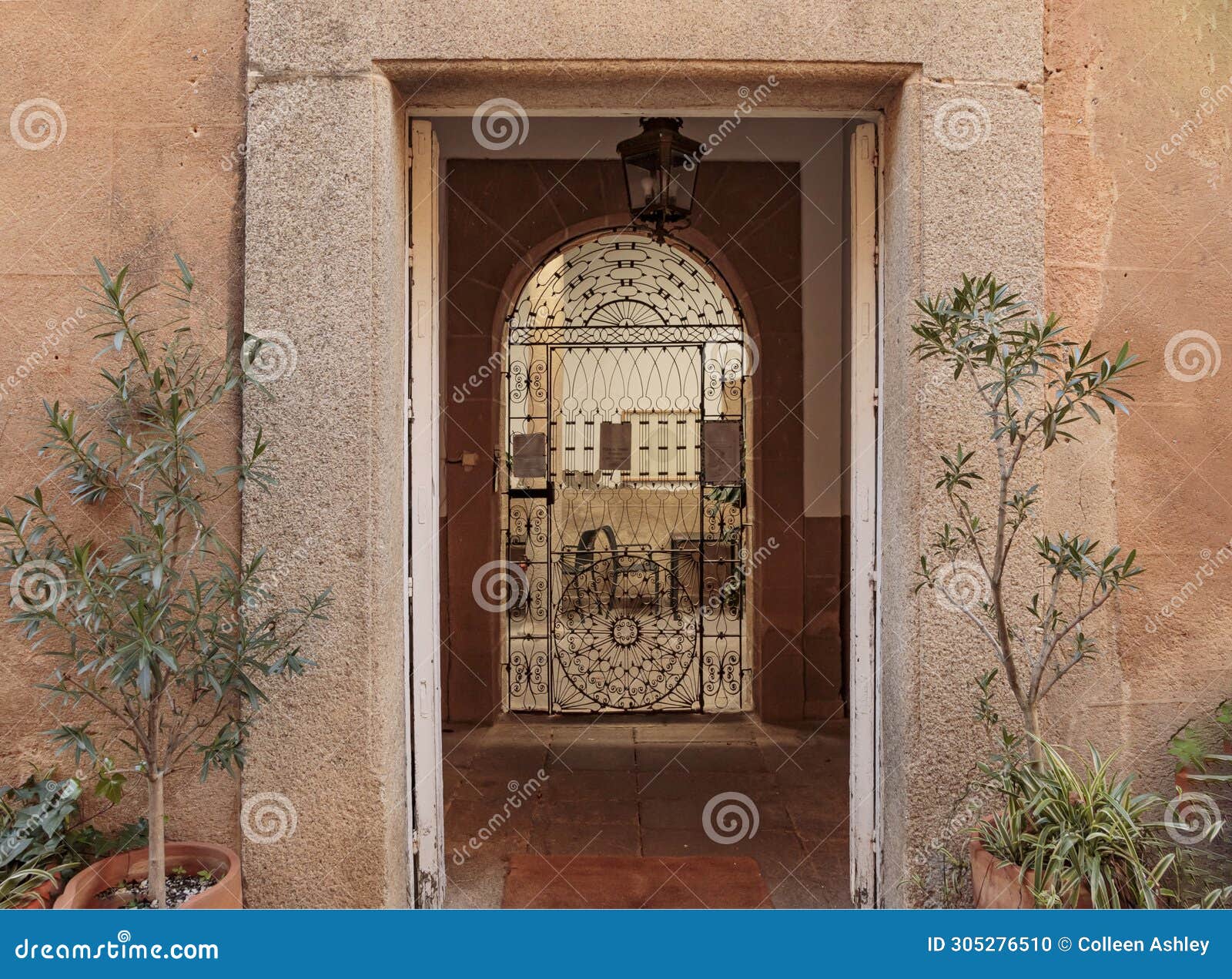 Looking into a Hallway of a Building at an Arched Gate Stock Photo ...