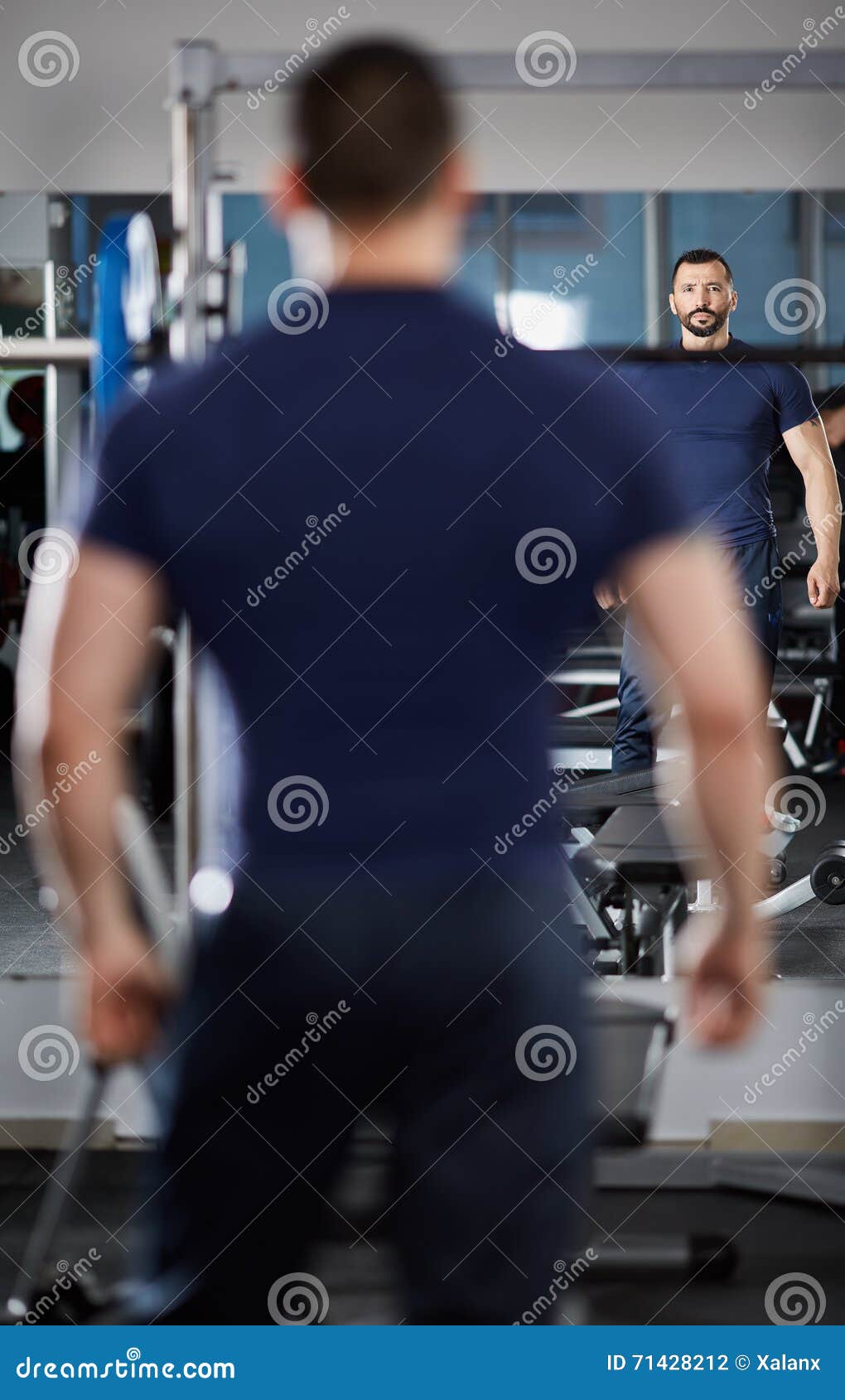 Looking at his progress stock photo. Image of athlete - 71428212