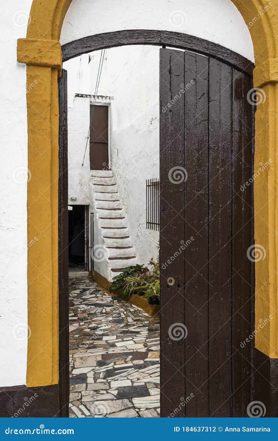 Looking Inside the Open Gate of a House, Ayamonte, Spain. Stock Photo ...